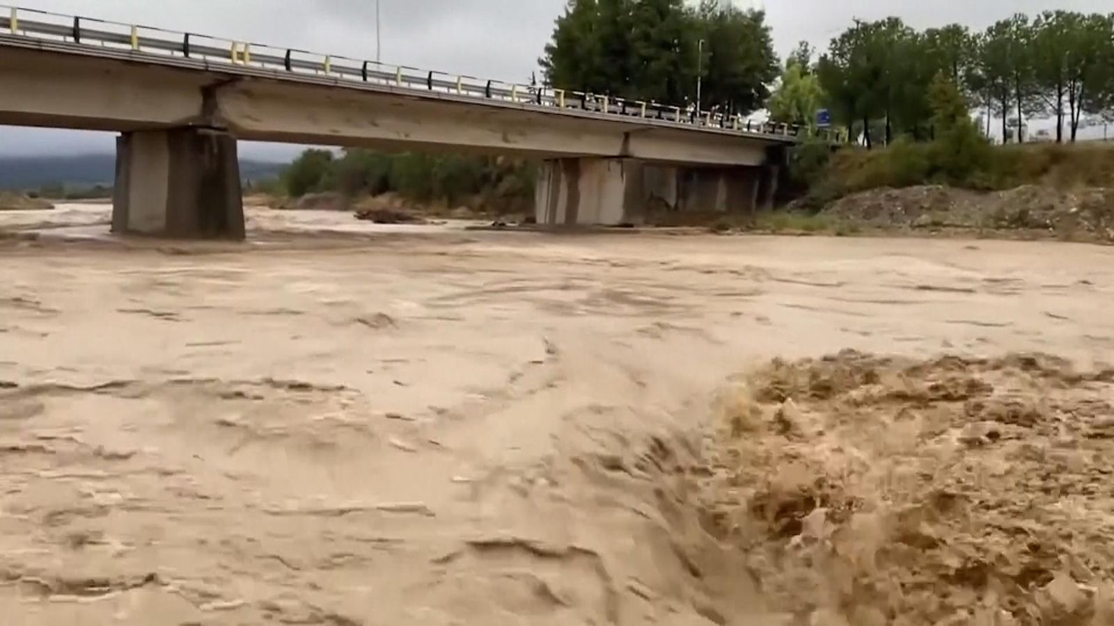 Greece: Torrential rain hits island of Evia, damaging roads and ...
