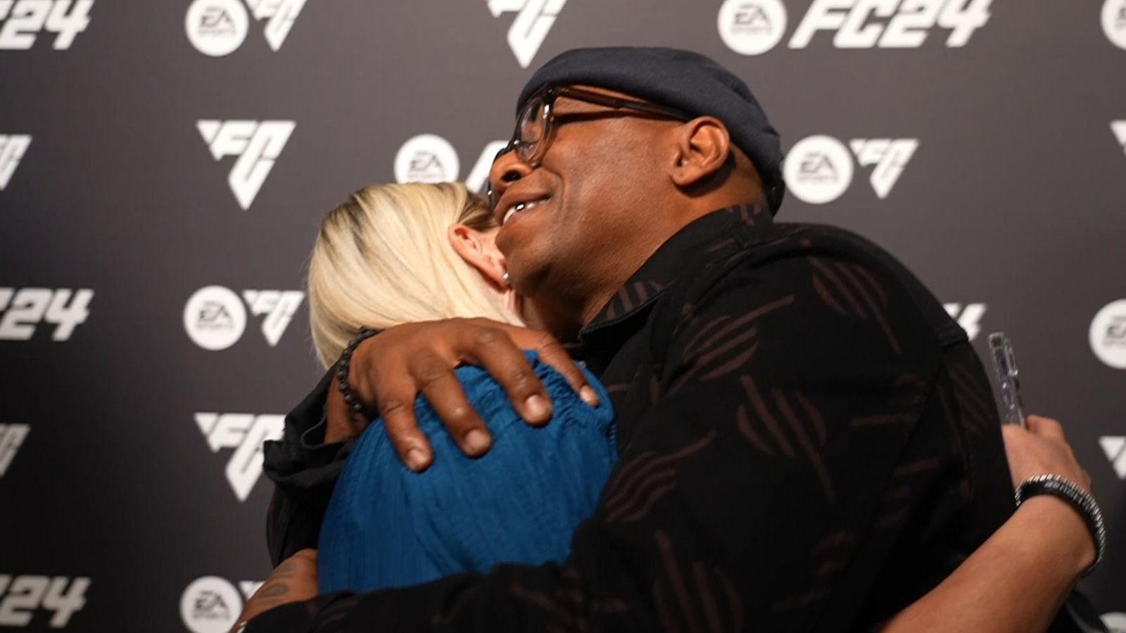 Kelly Smith and Ian Wright share a hug at EA Sports FC 24 launch | UK News | Sky News