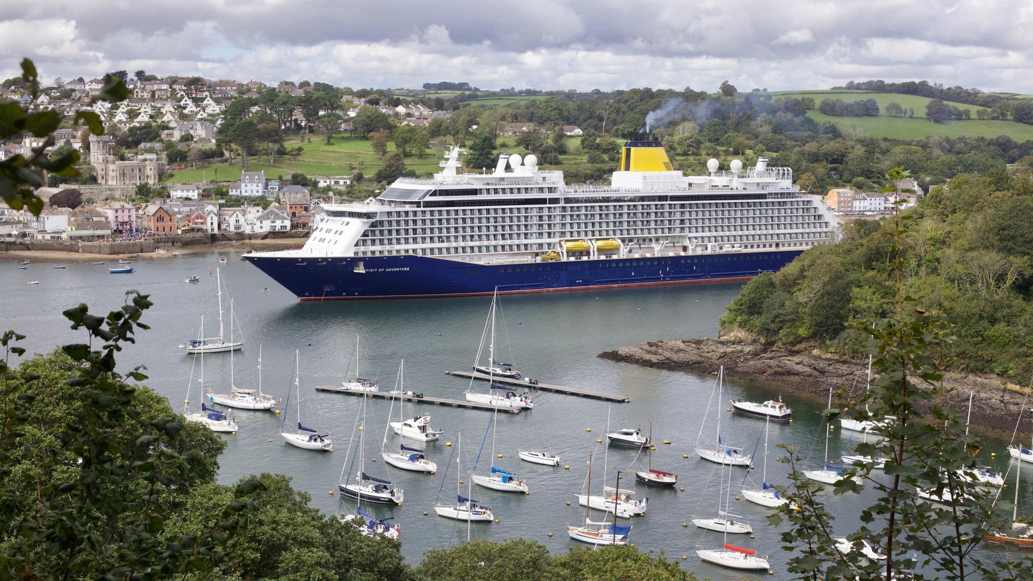 Tiny Cornish port town of Fowey hosts 60,000 tonne cruise ship | UK News | Sky News