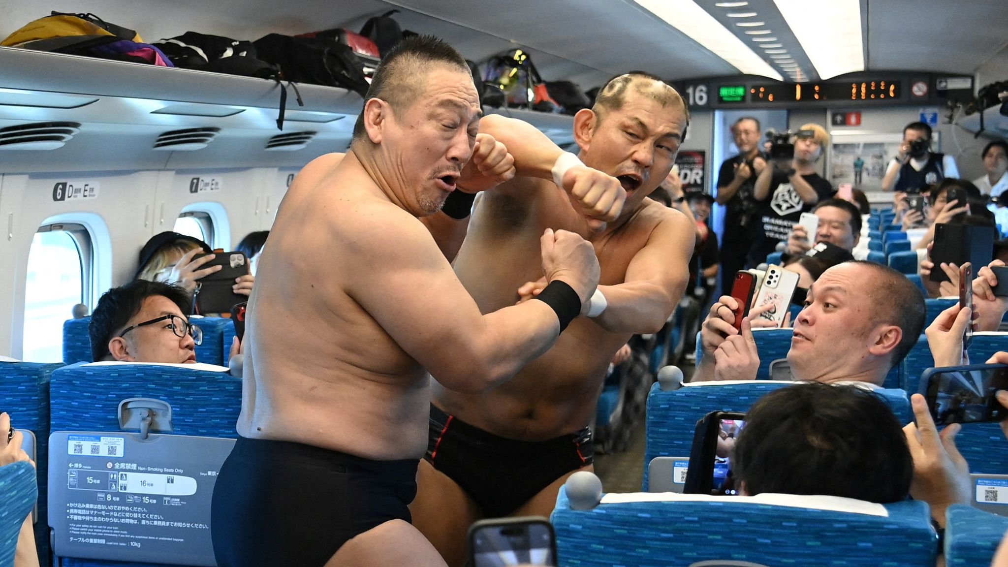Wrestlers brawl on packed bullet train in Japan | World News | Sky News