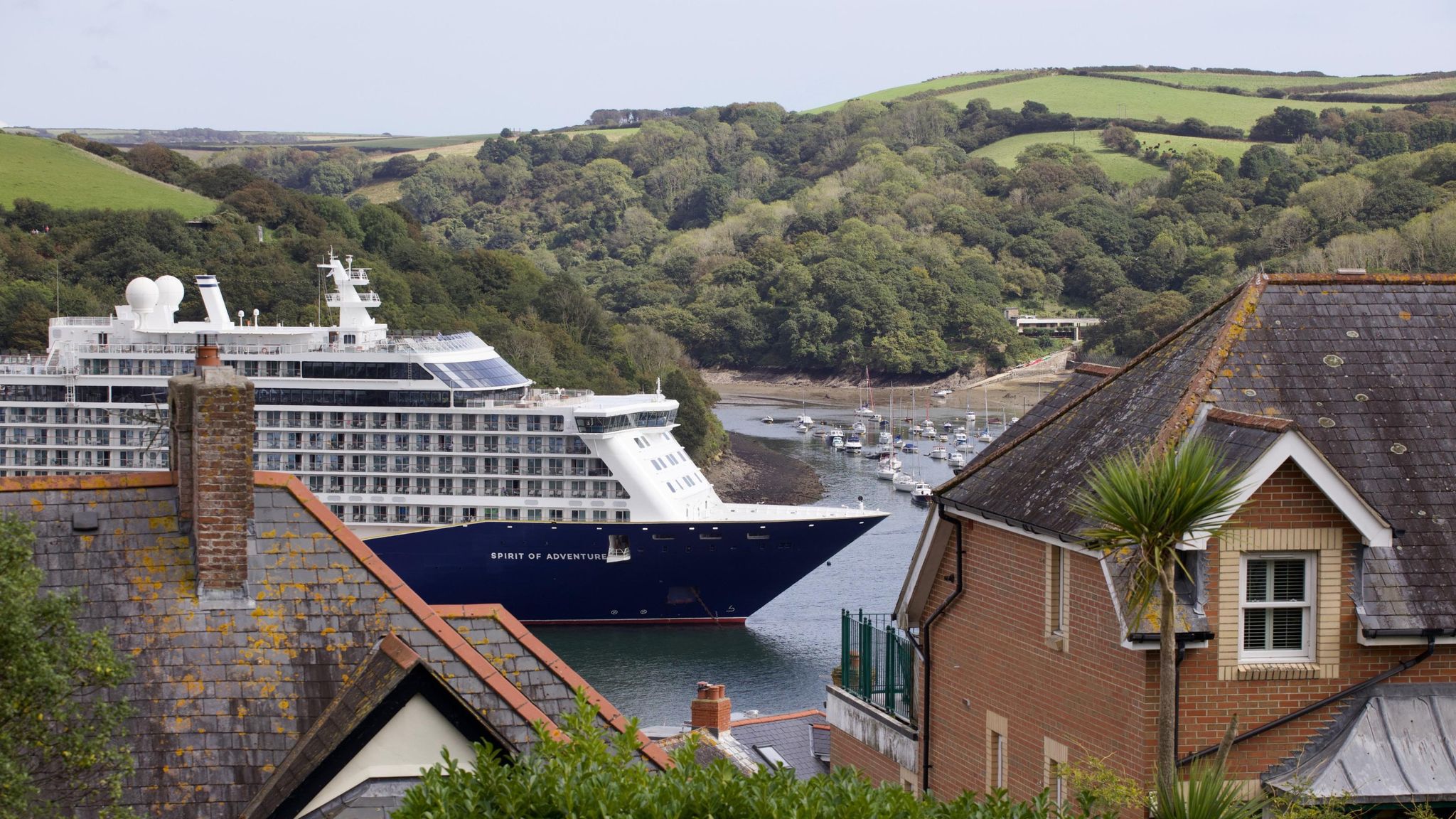 Tiny Cornish port town of Fowey hosts 60,000 tonne cruise ship | UK News | Sky News