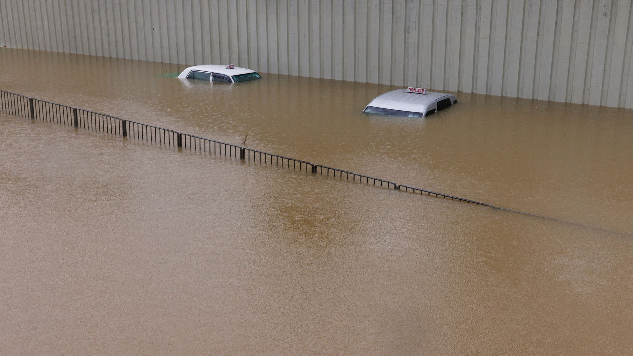 Two dead after Hong Kong flooded by heaviest rainfall in almost 140 ...