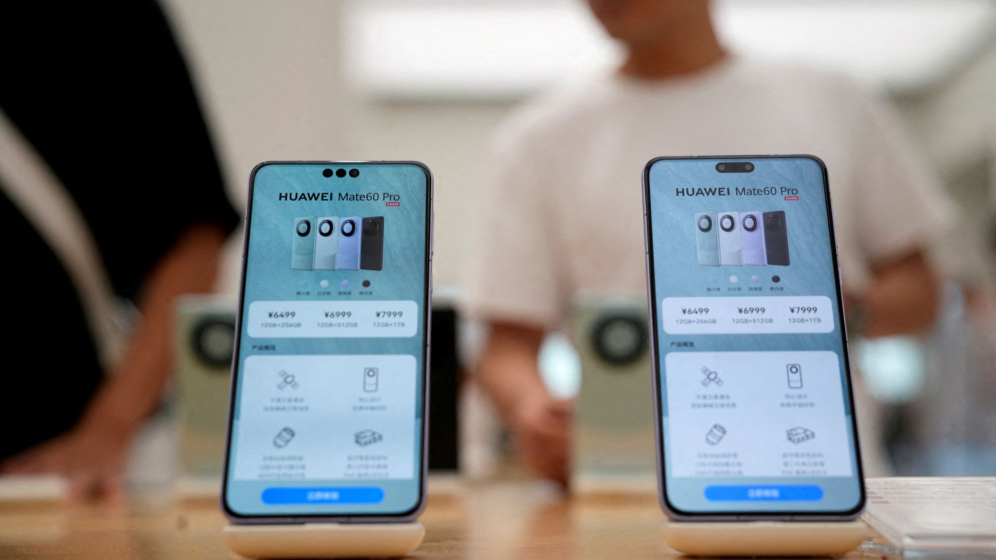 China iPhone curbs take £160bn bite out of Apple as rival Huawei ...