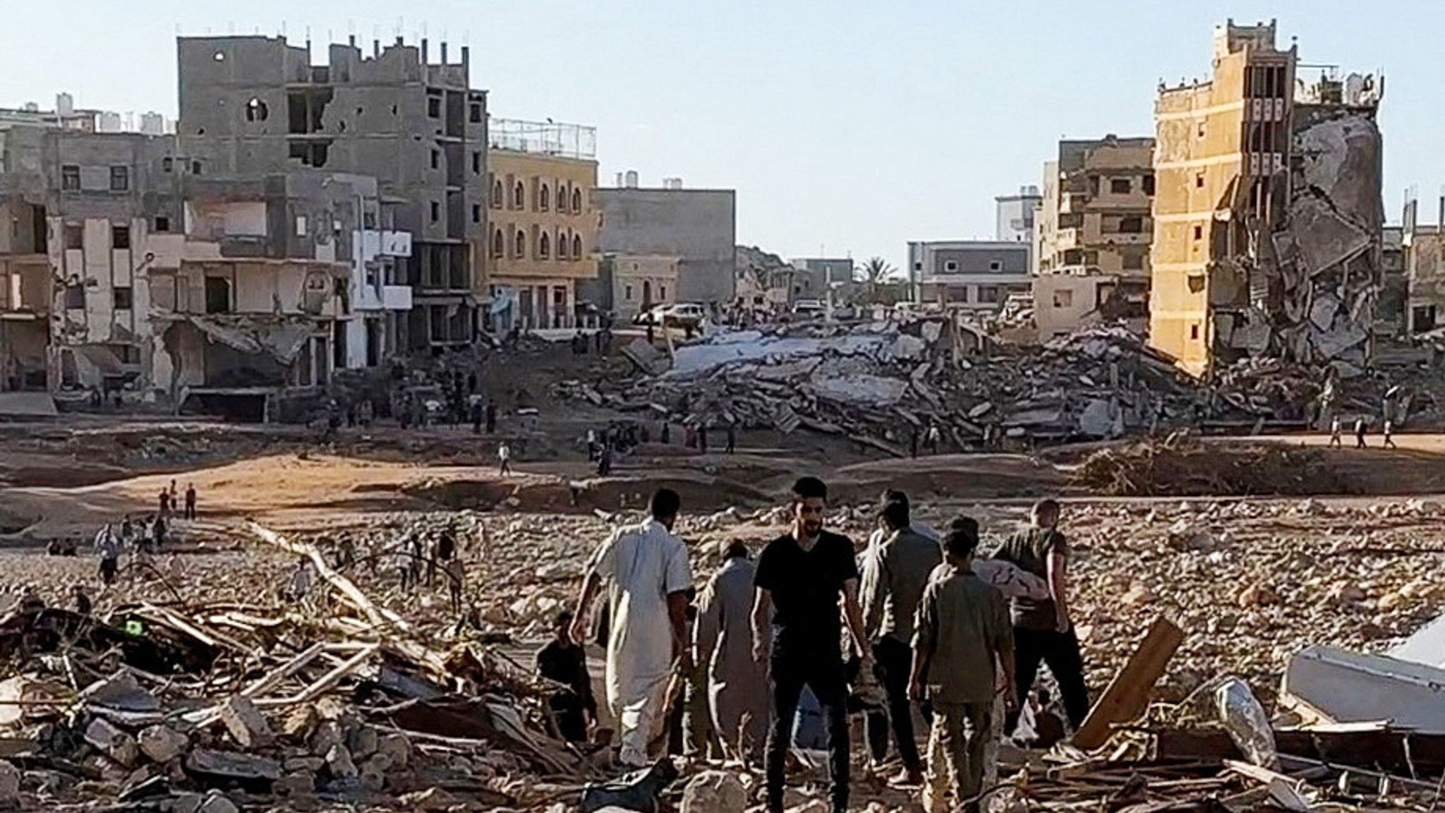 Libya floods: Collapsed bridges and wrecked homes seen in before and ...