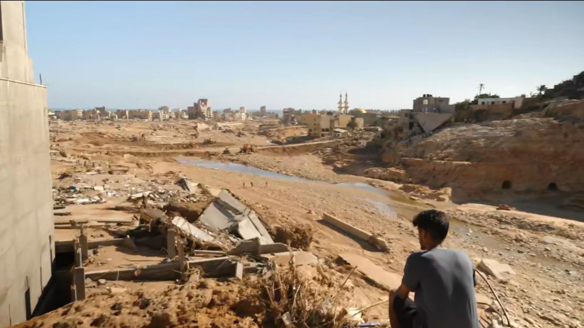 Libya floods: Collapsed bridges and wrecked homes seen in before and ...
