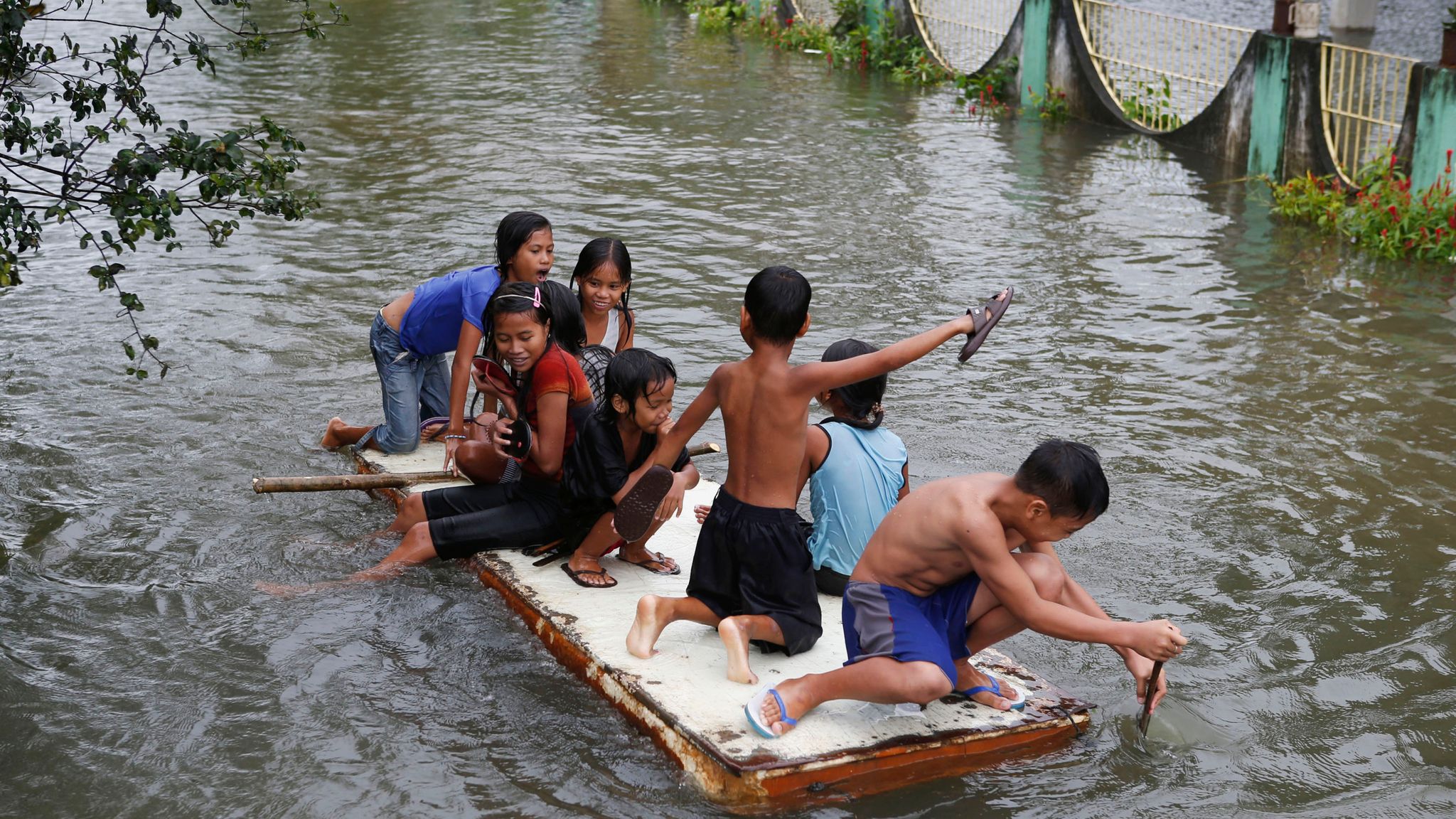 Up to 20,000 children displaced every day by storms, floods and wildfires, UNICEF says | World ...