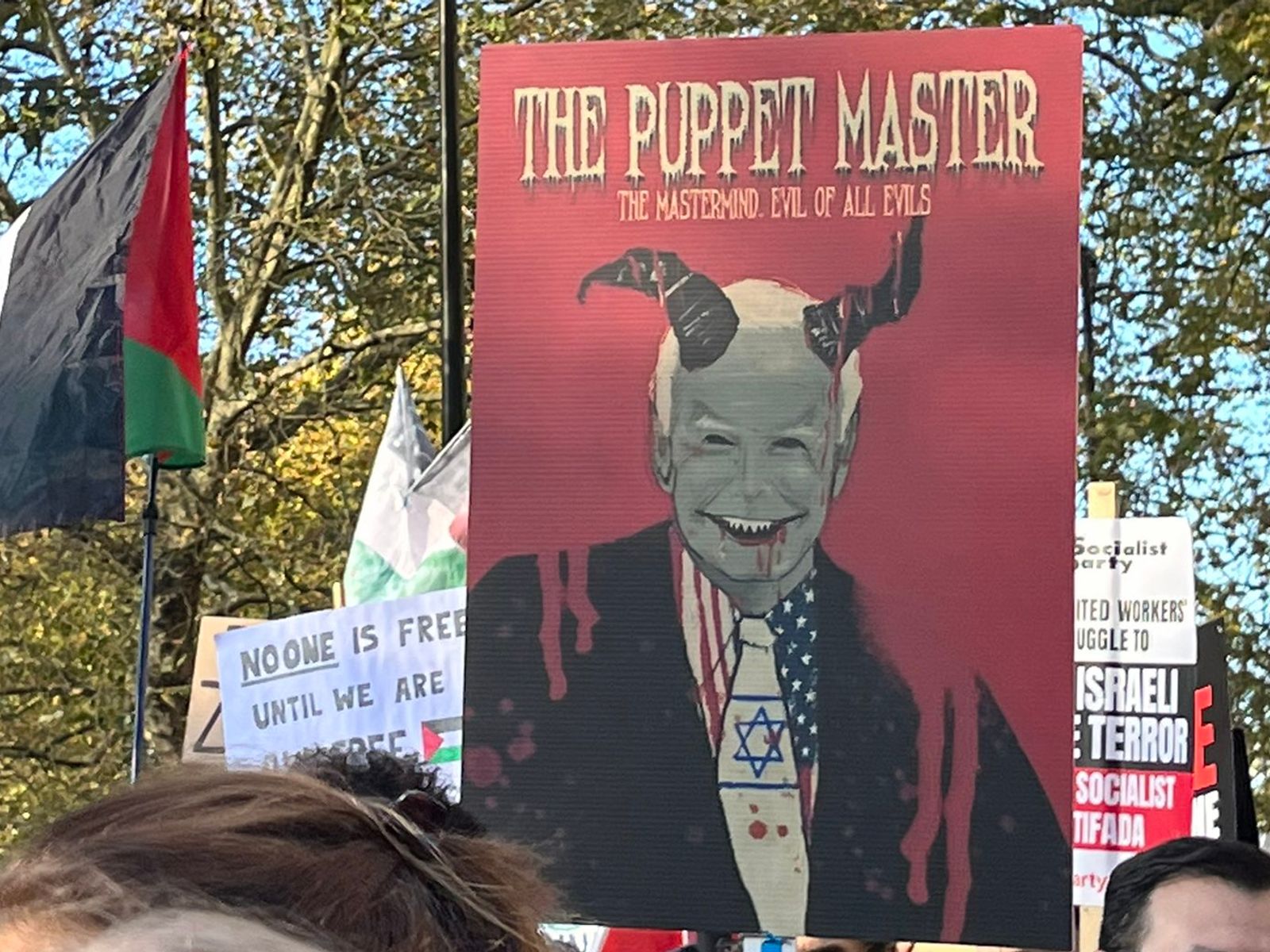 Police 'actively looking' for individuals over antisemitic signs at pro ...