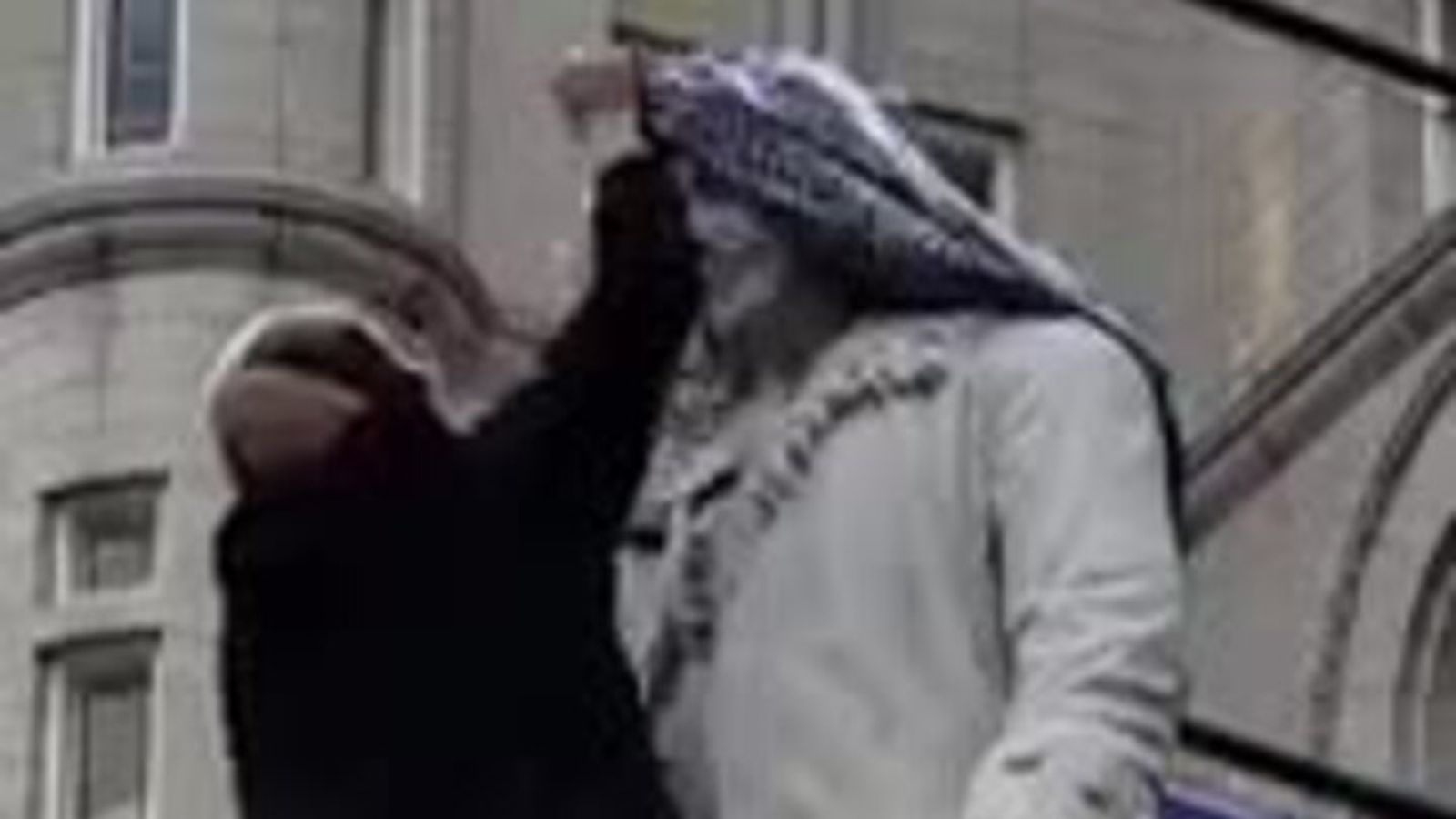Israel-Hamas war: Pro-palestinian protester puts keffiyeh scarf on ...