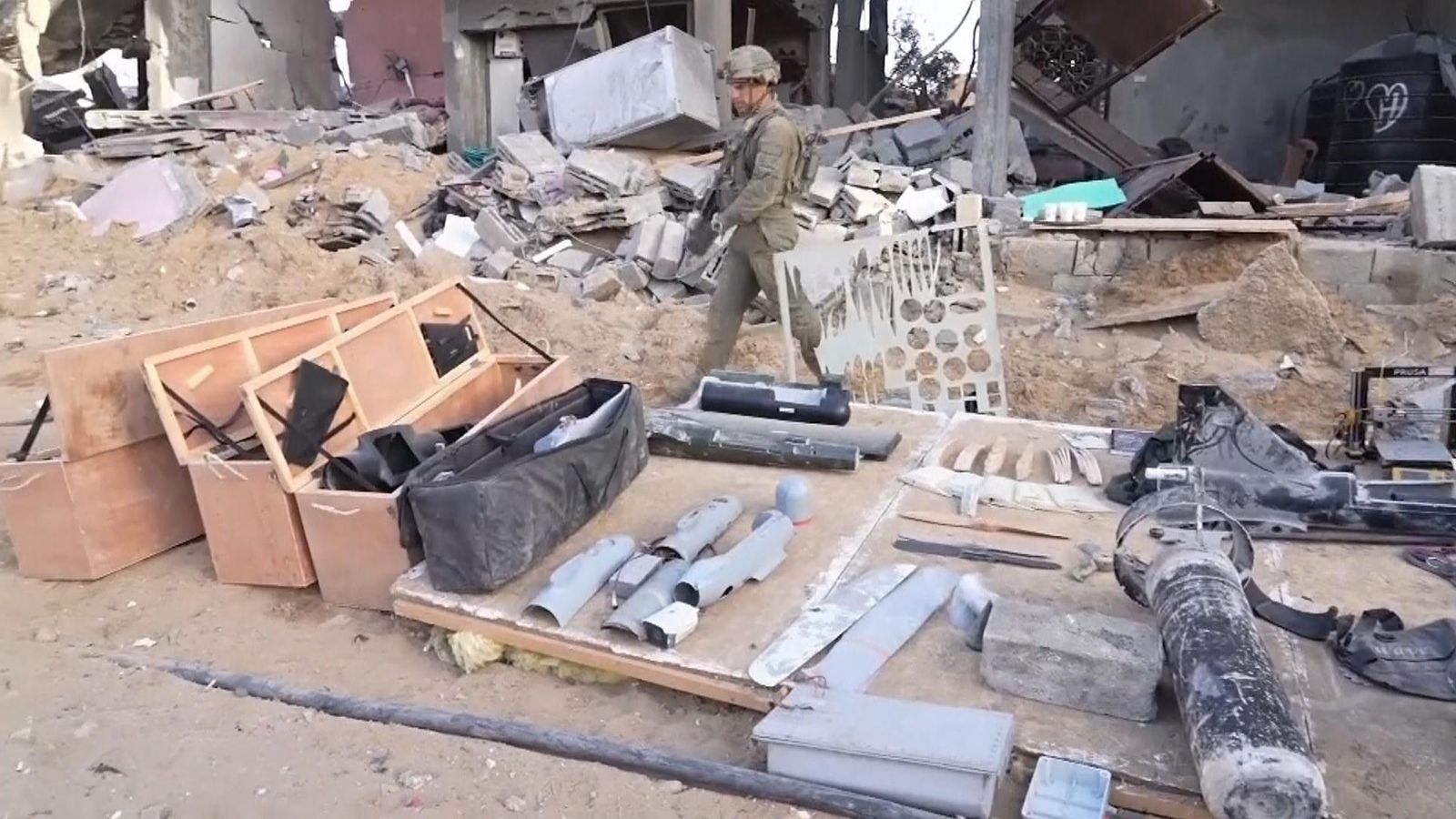 Israel army shows weapons they say belonged to Hamas, hidden inside ...