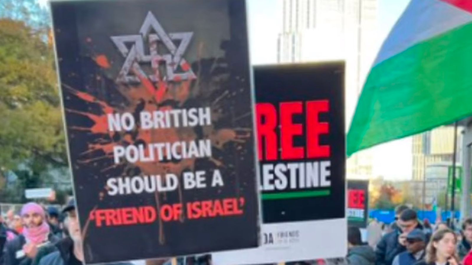 Police 'actively looking' for individuals over antisemitic signs at pro ...