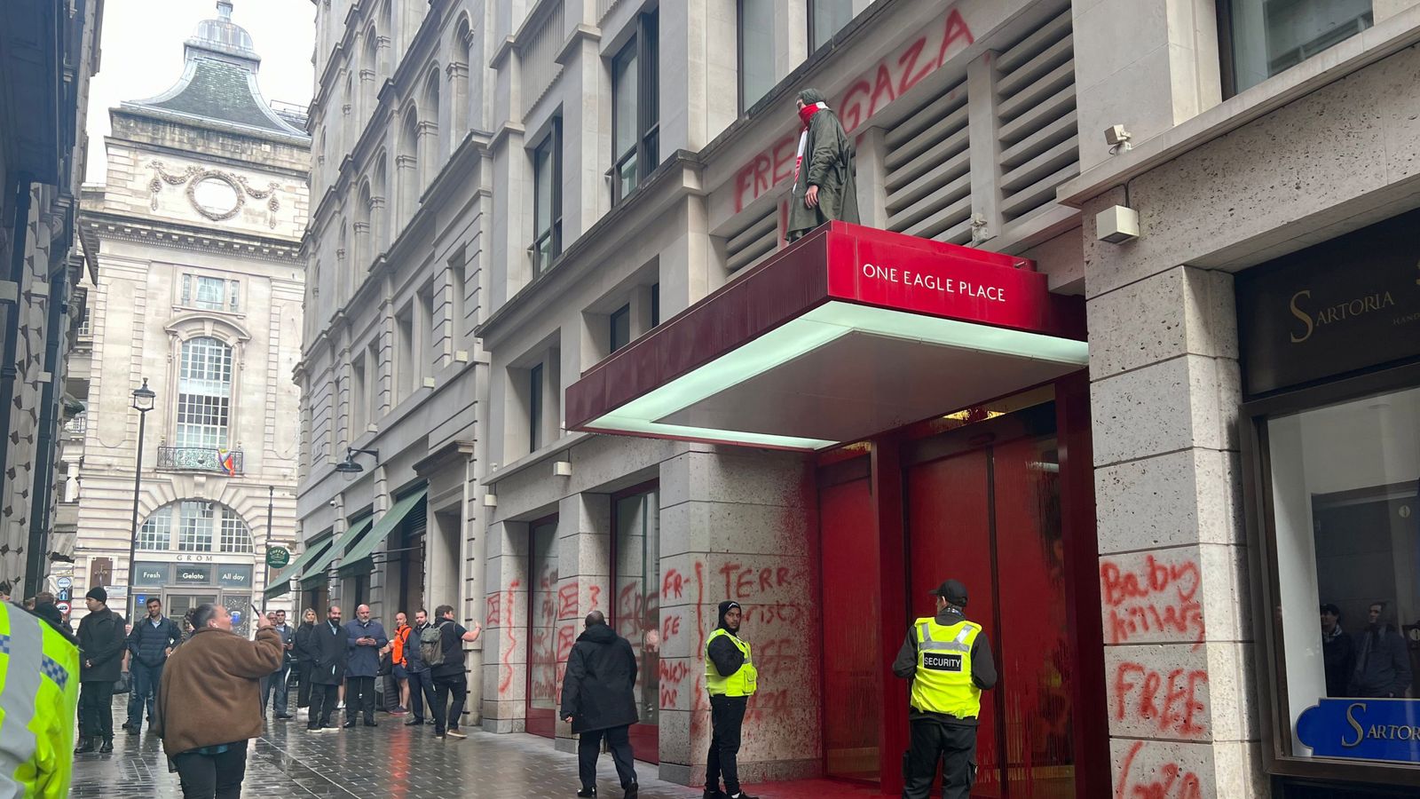 Activists hurl red paint over London building in 'Free Gaza' protest ...