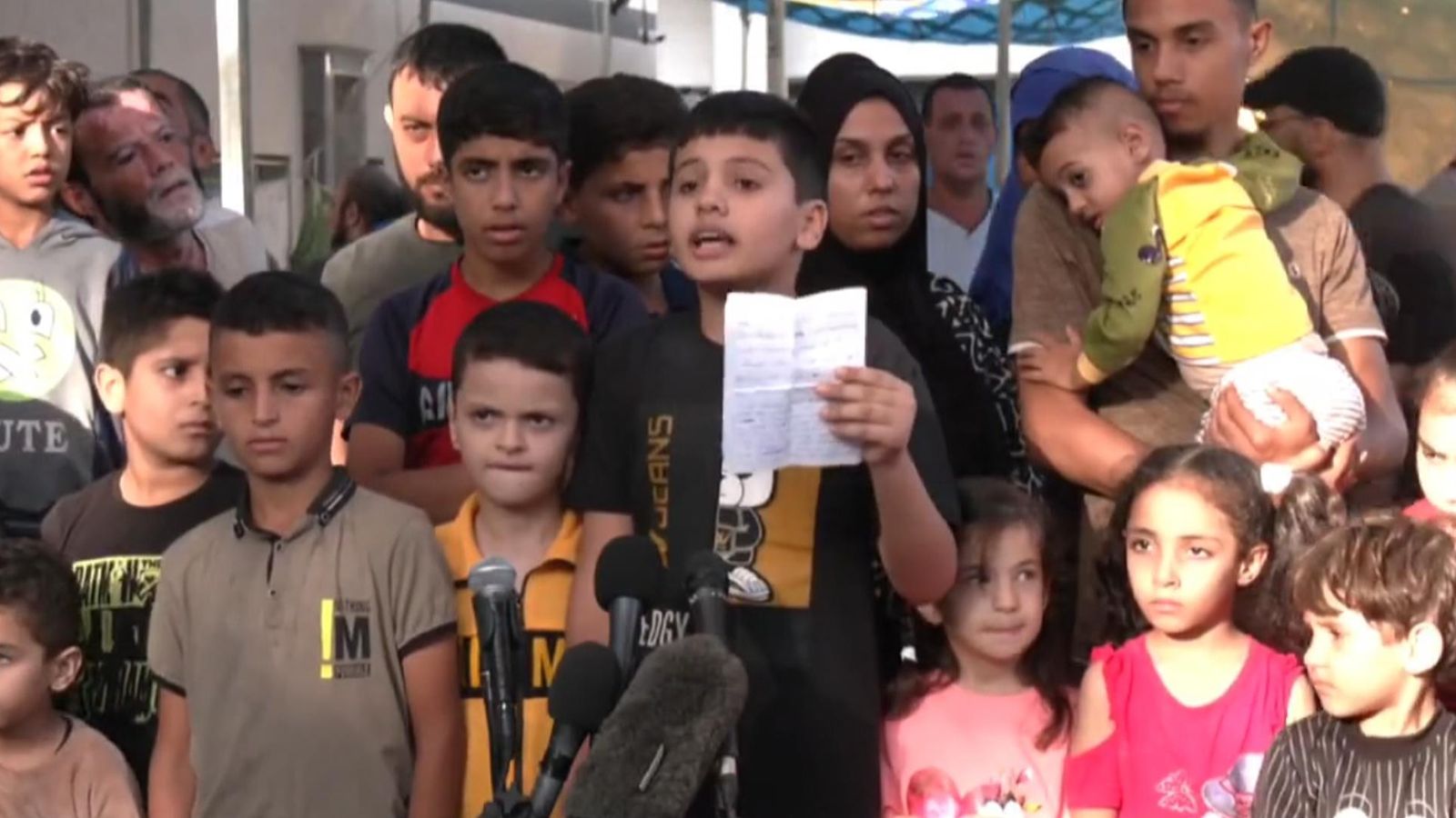 Palestinian children in Gaza hold a news conference and plead for peace ...