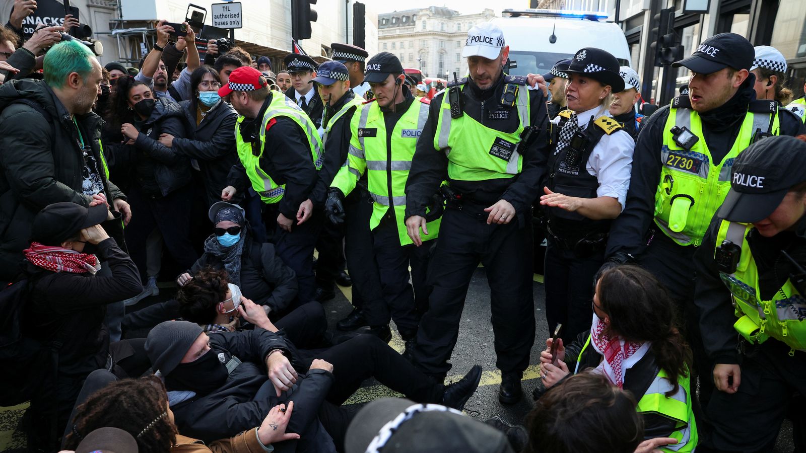 Pro-Palestinian protesters set off fireworks into crowd - four police ...