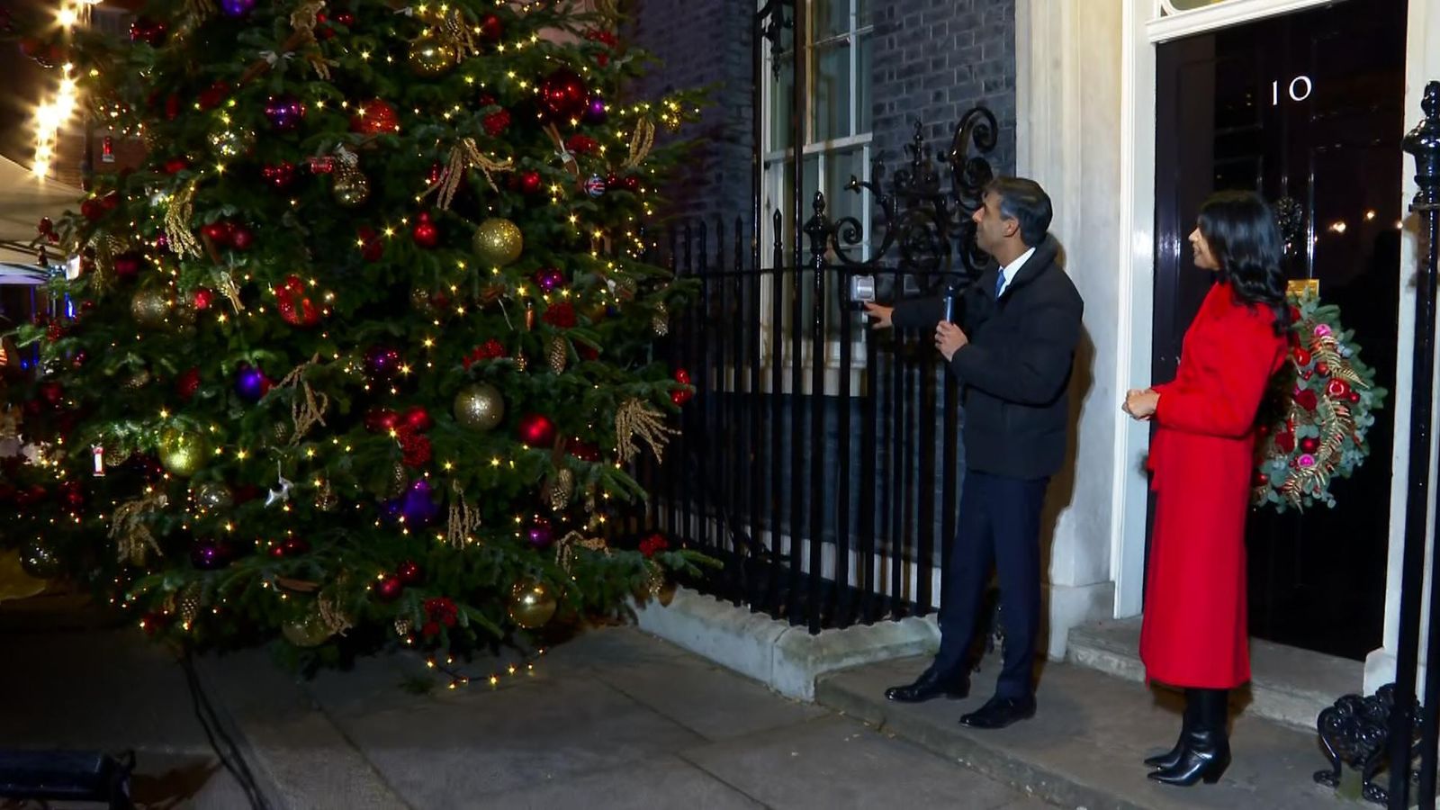 Rishi Sunak lights up Downing Street as he switches on Christmas lights ...