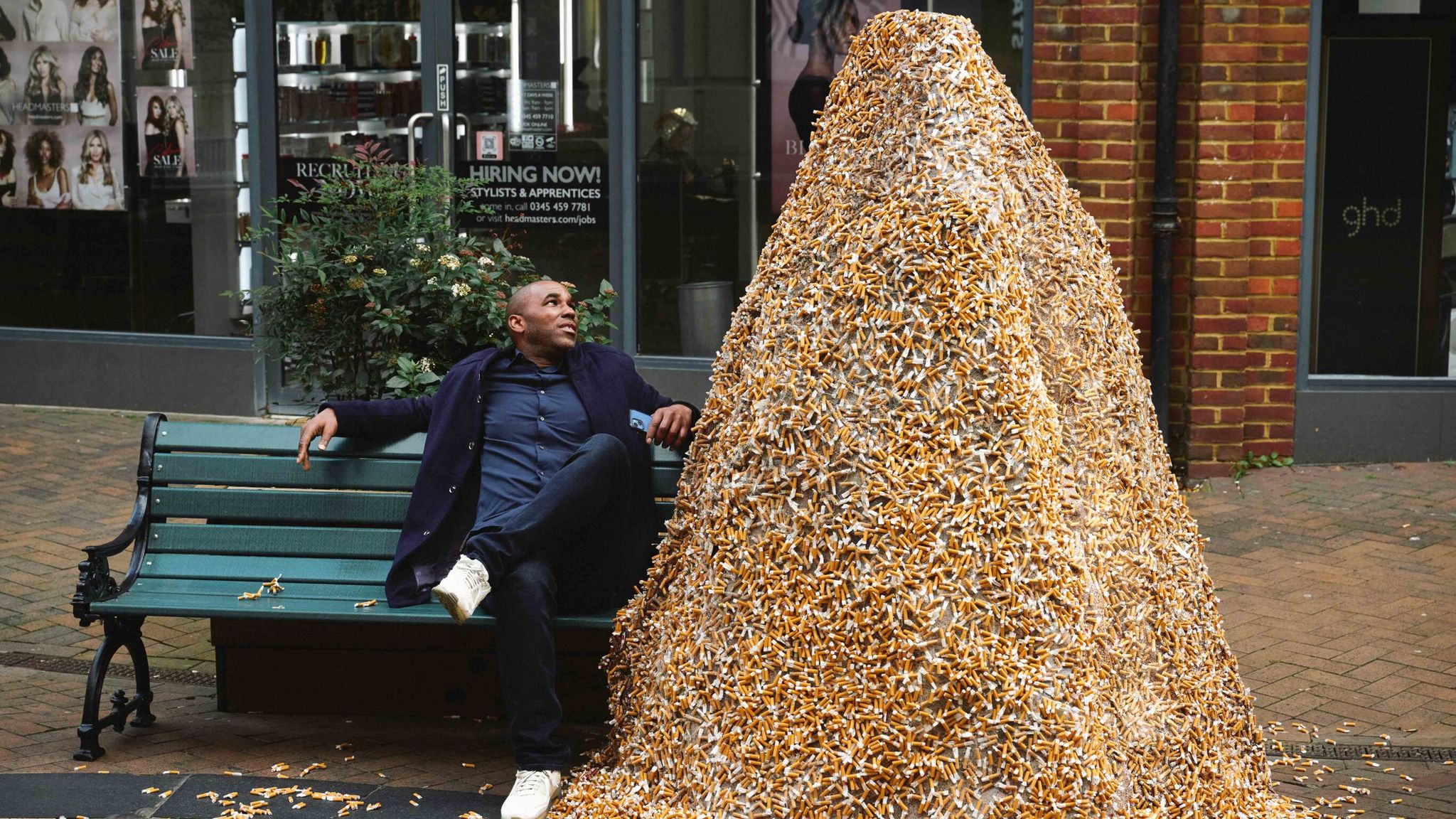 Mountain of cigarette butts dumped on high street to encourage smokers ...
