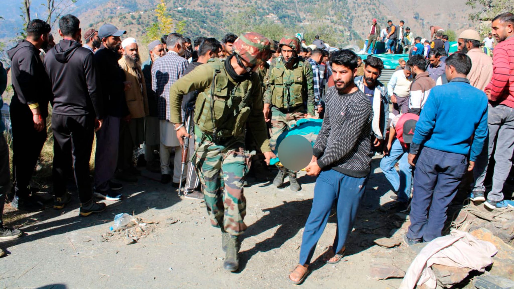 India bus crash: At least 39 dead after vehicle veers off mountain road ...