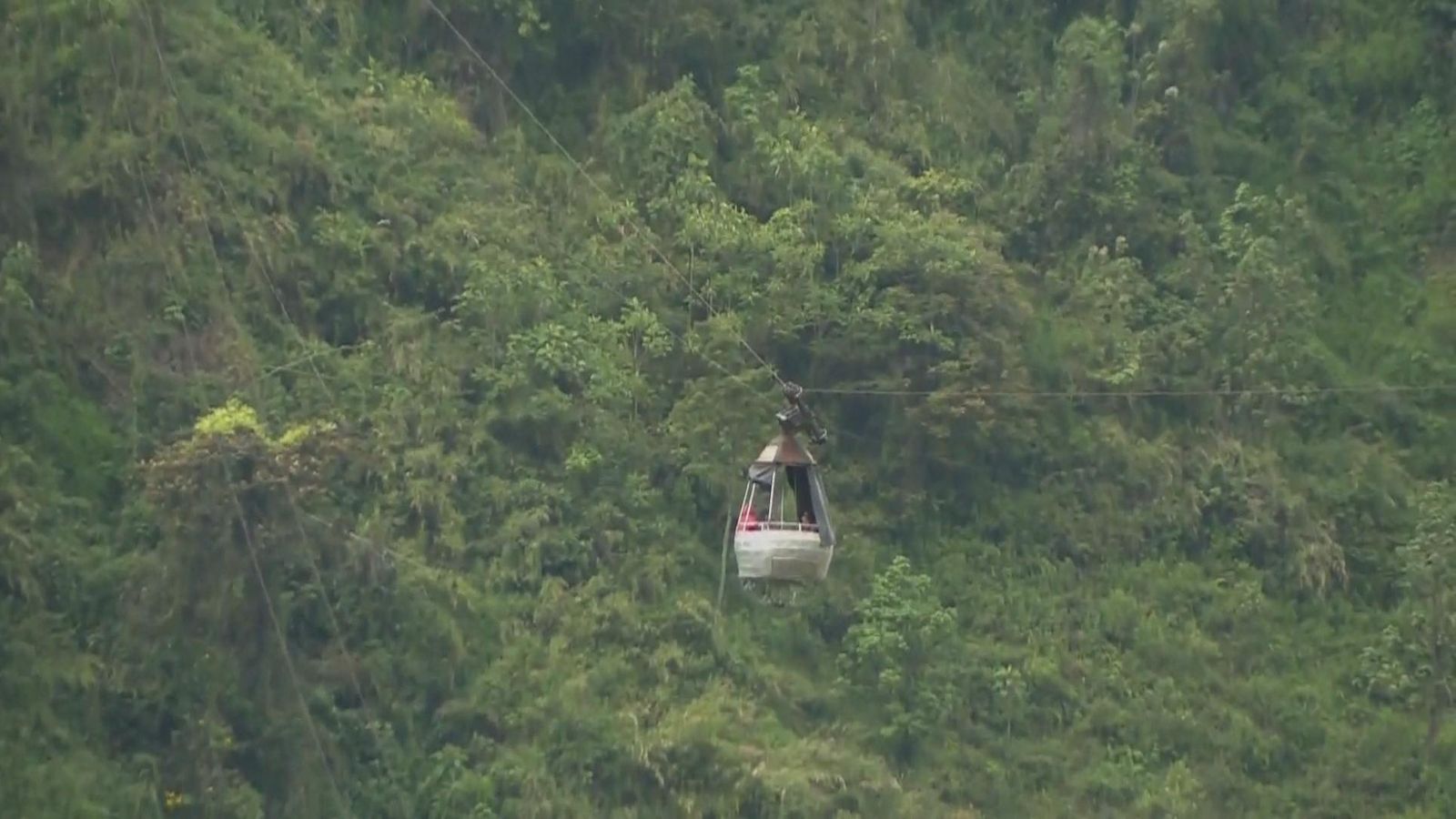 Five people trapped in cable car hanging over ravine in Colombia ...