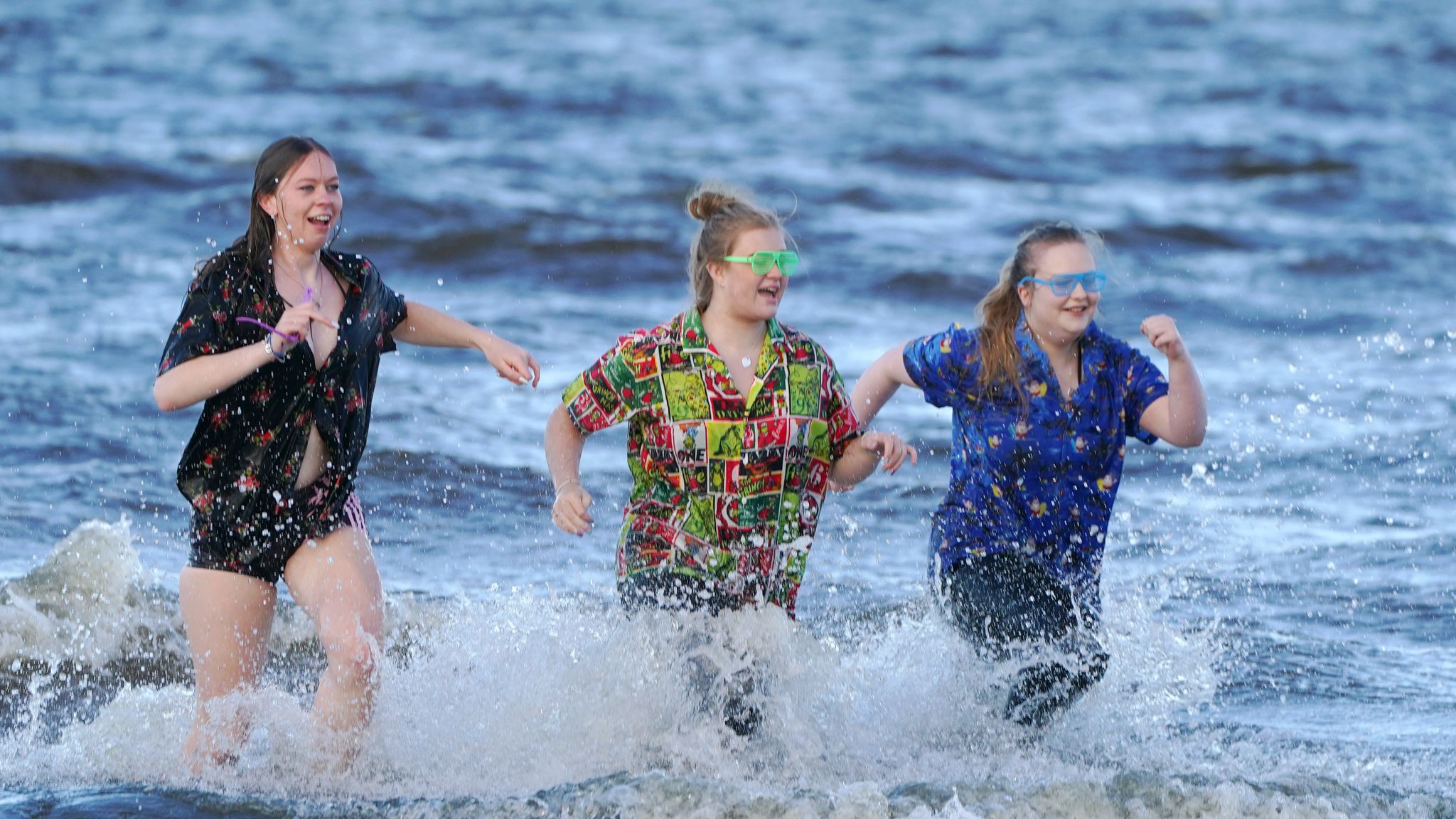 Boxing Day in pictures across the country - as UK splashes, shops and ...