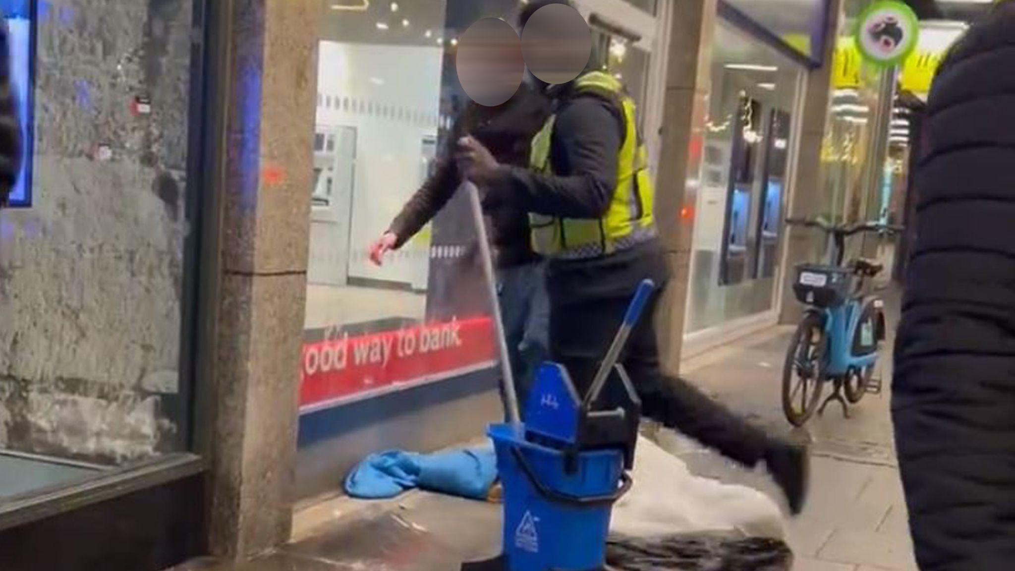 'Bang out of order': Anger as security guard mops floor where homeless ...