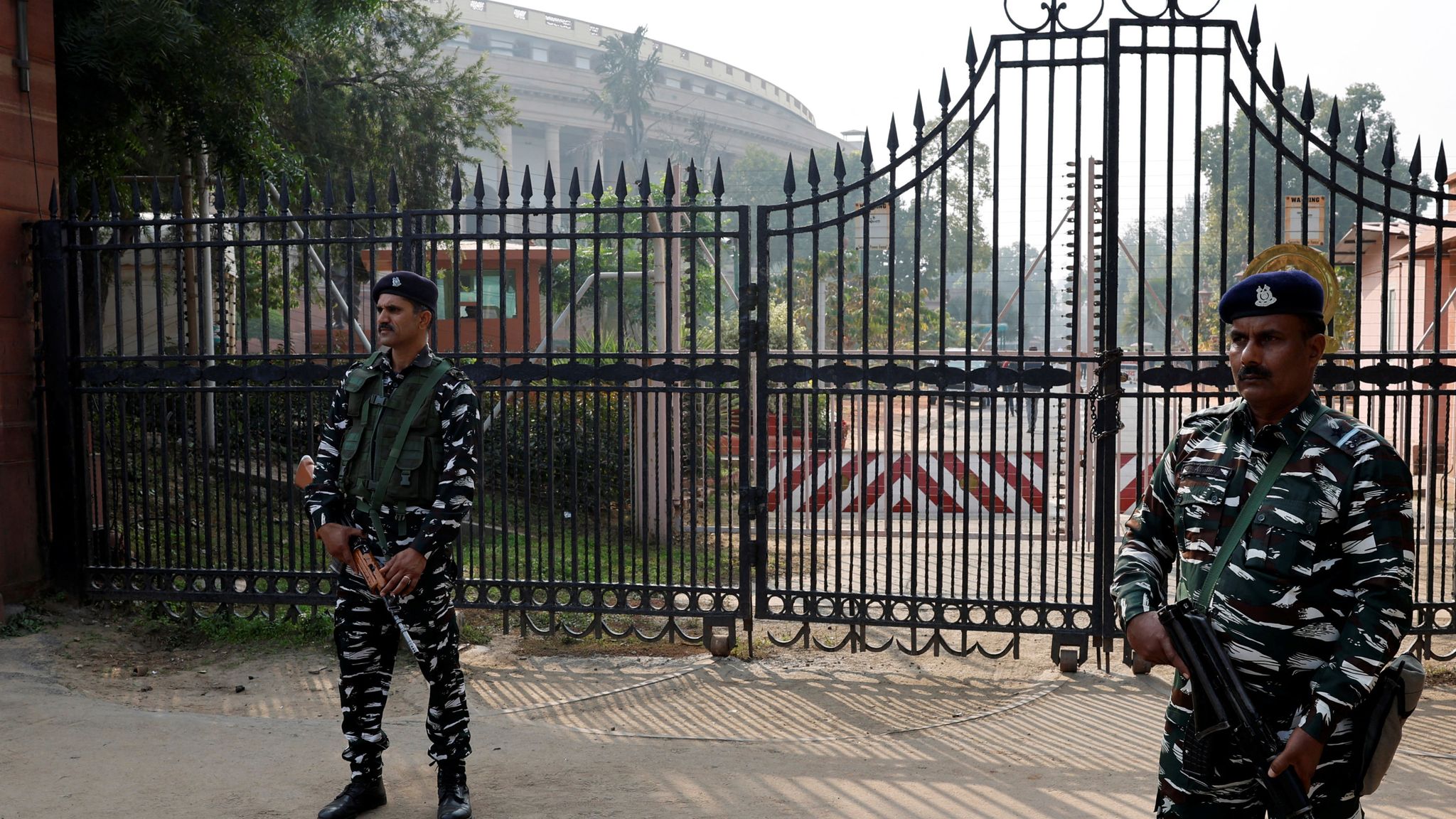 Security breach inside India's parliament building with canisters of ...