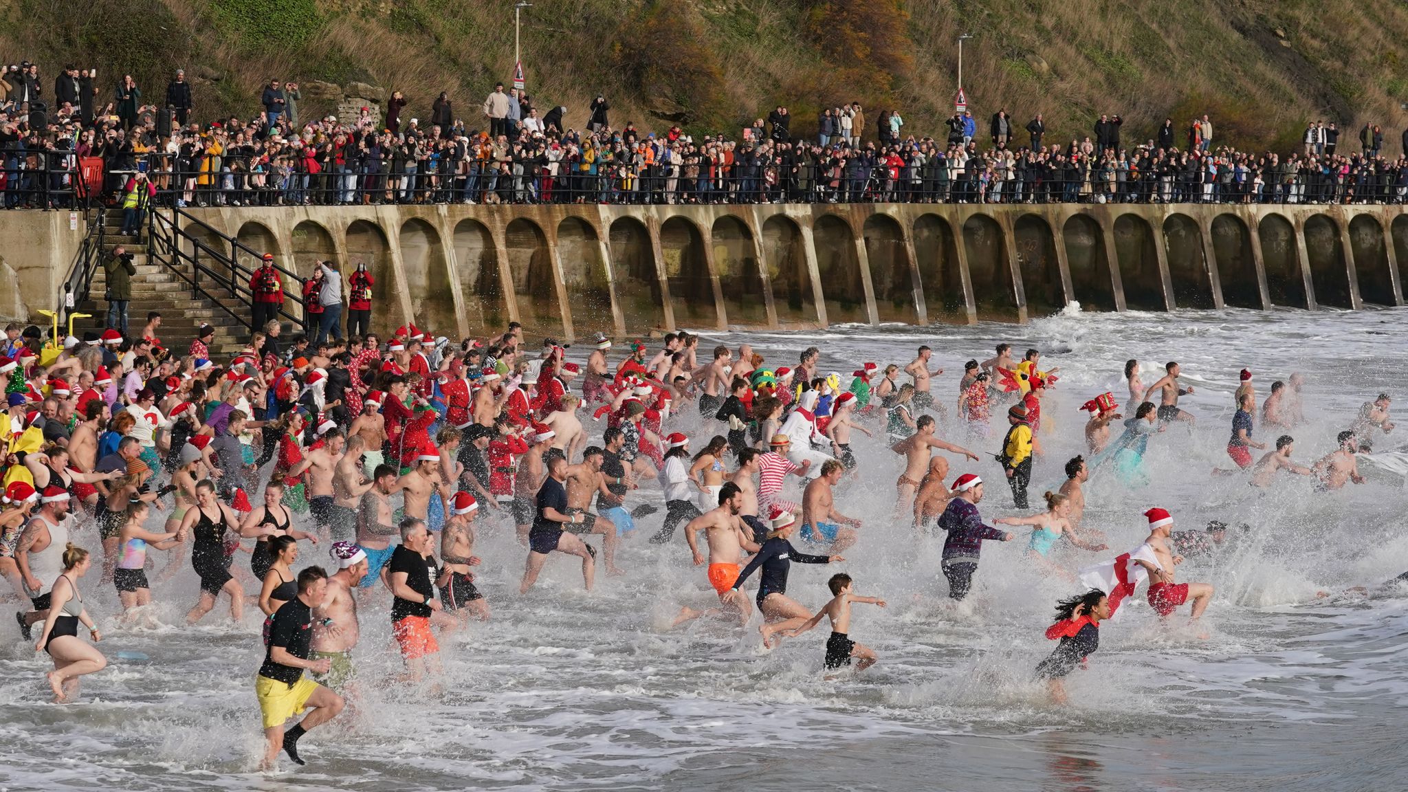 Boxing Day in pictures across the country - as UK splashes, shops and ...