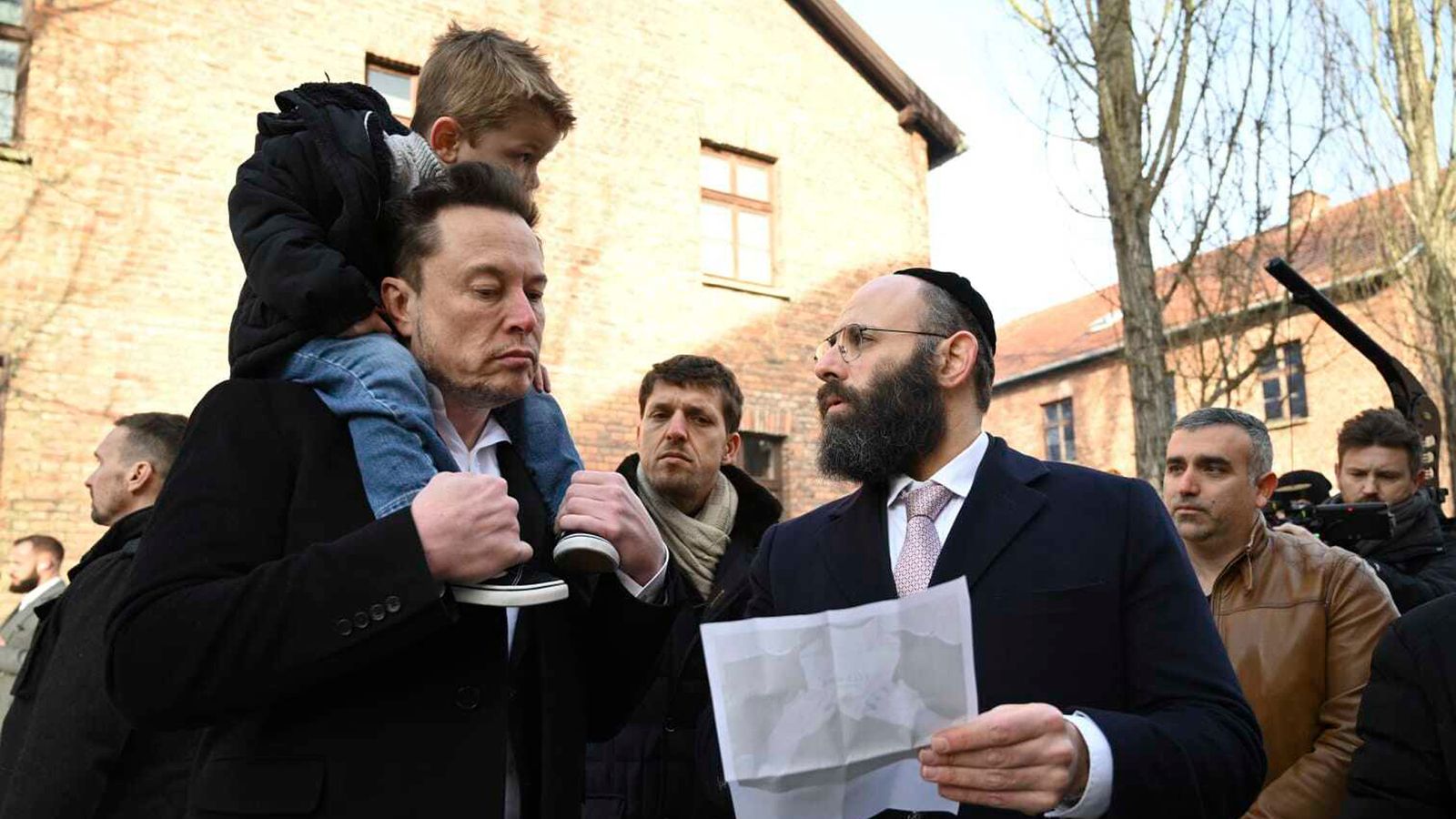 Elon Musk visits Auschwitz concentration camp in Poland | World News ...