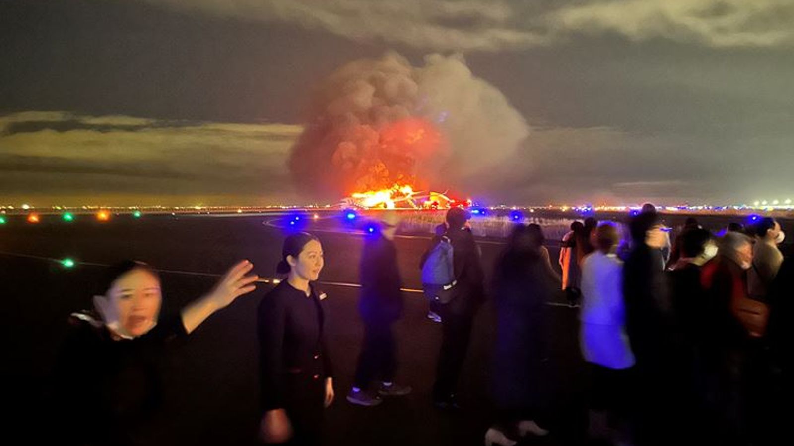 Japan plane fire: Family 'still in shock' after evacuating burning ...