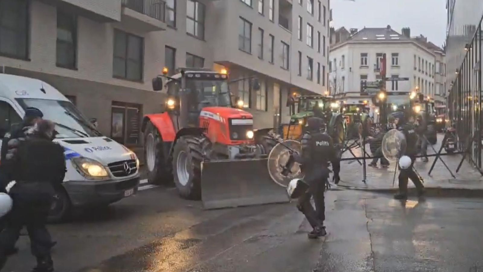 Farmers smash through police barricades and dump manure in protest over ...