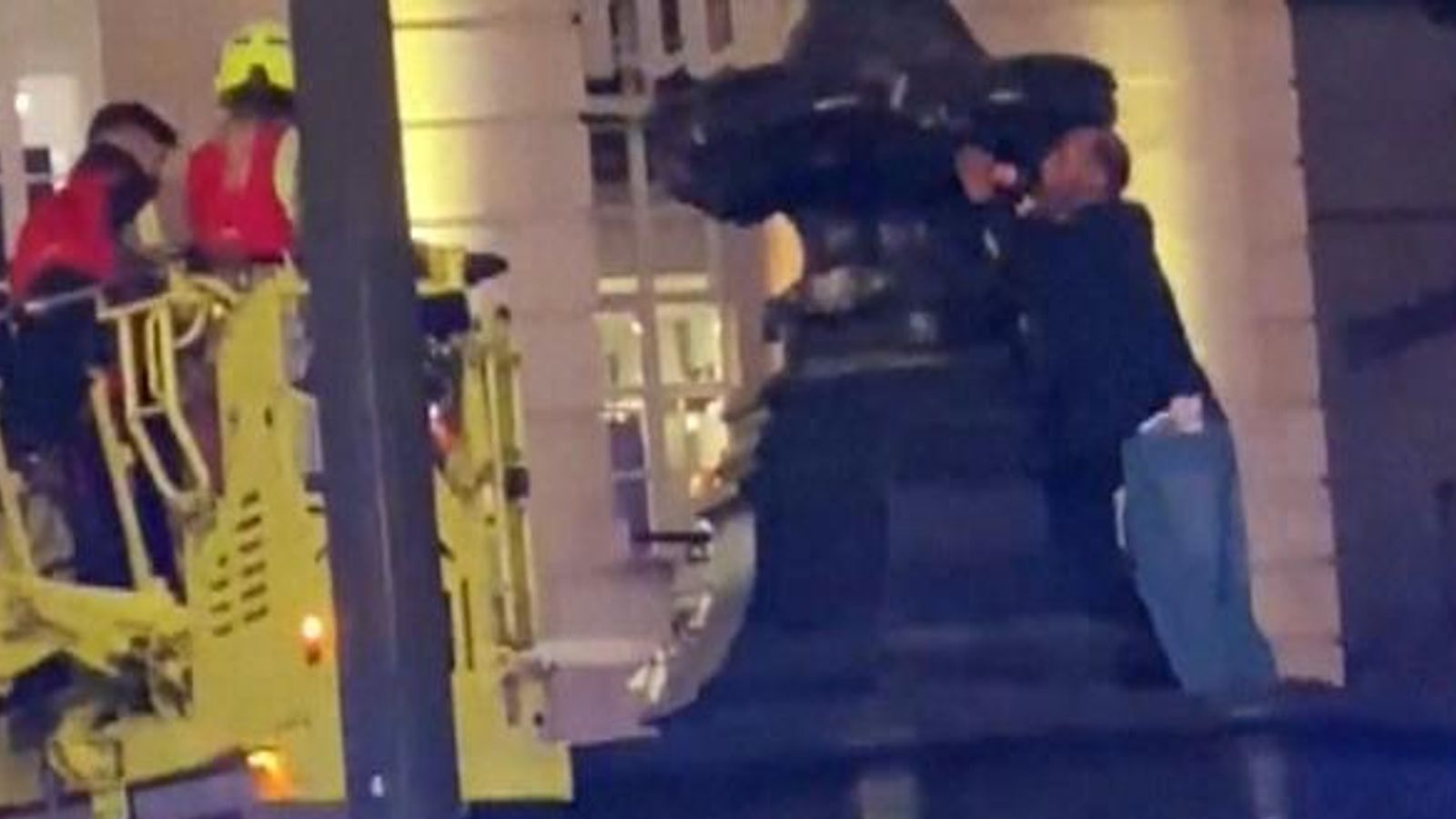Man arrested after climbing London's Eros statue in Piccadilly Circus ...