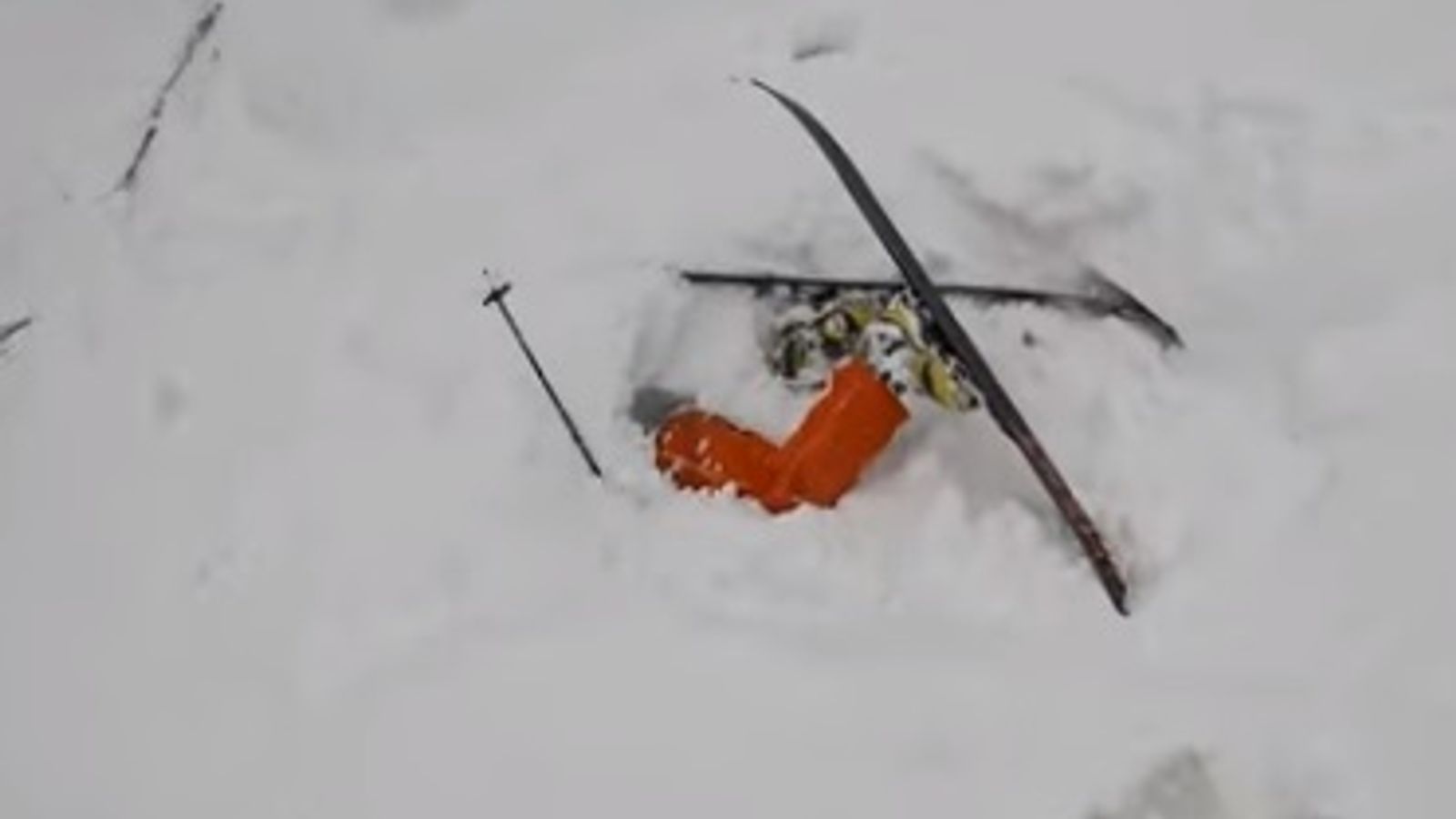Terrifying video showing man buried headfirst in snow released as ...