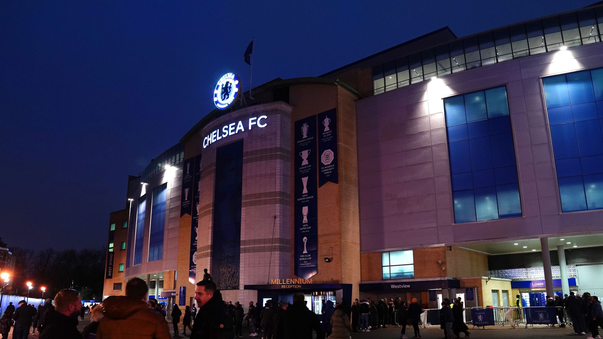 Leeds fan taken to hospital after falling from top tier of stand at ...