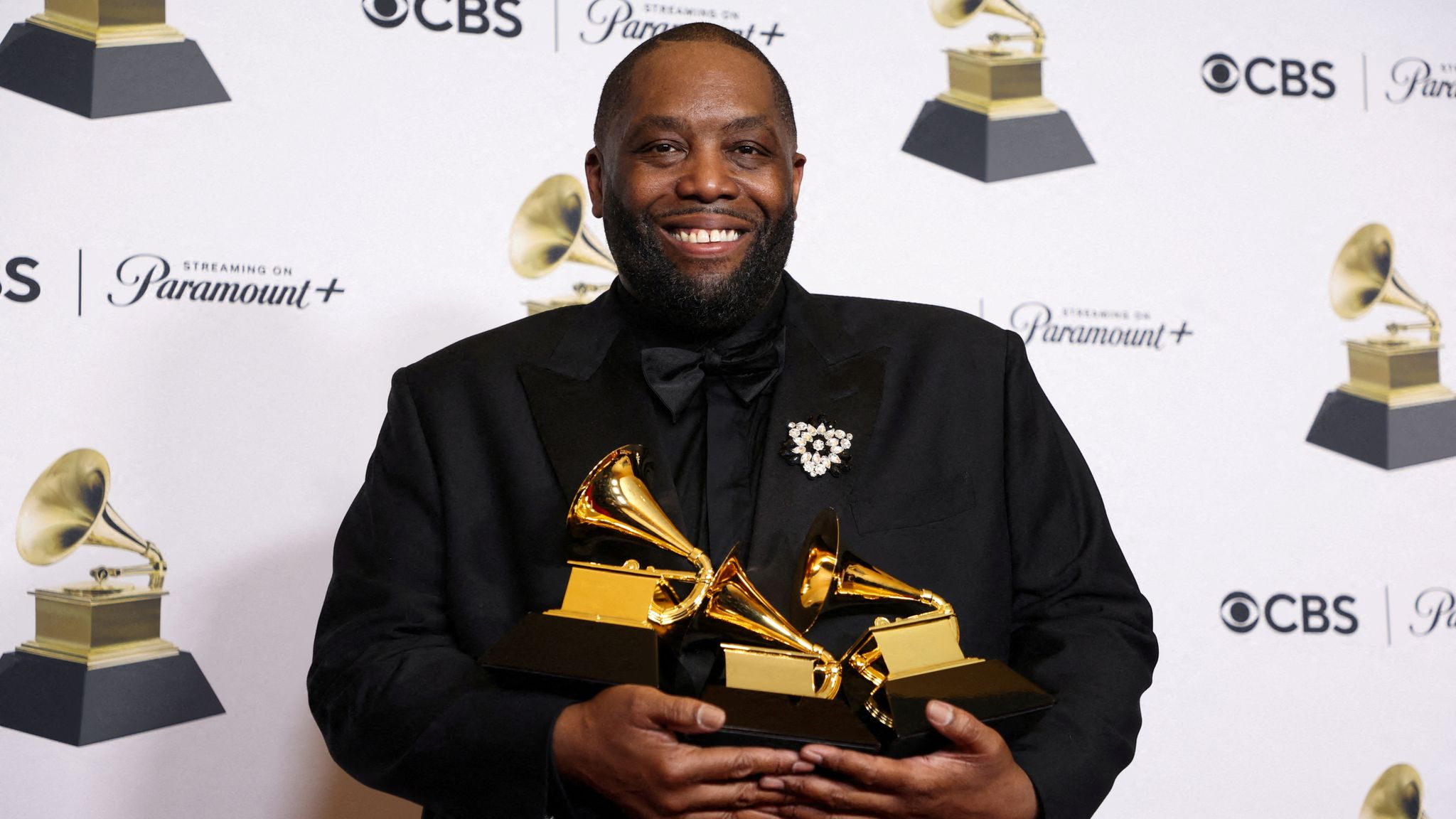 Rapper Killer Mike 'escorted out of Grammys in handcuffs' after winning ...