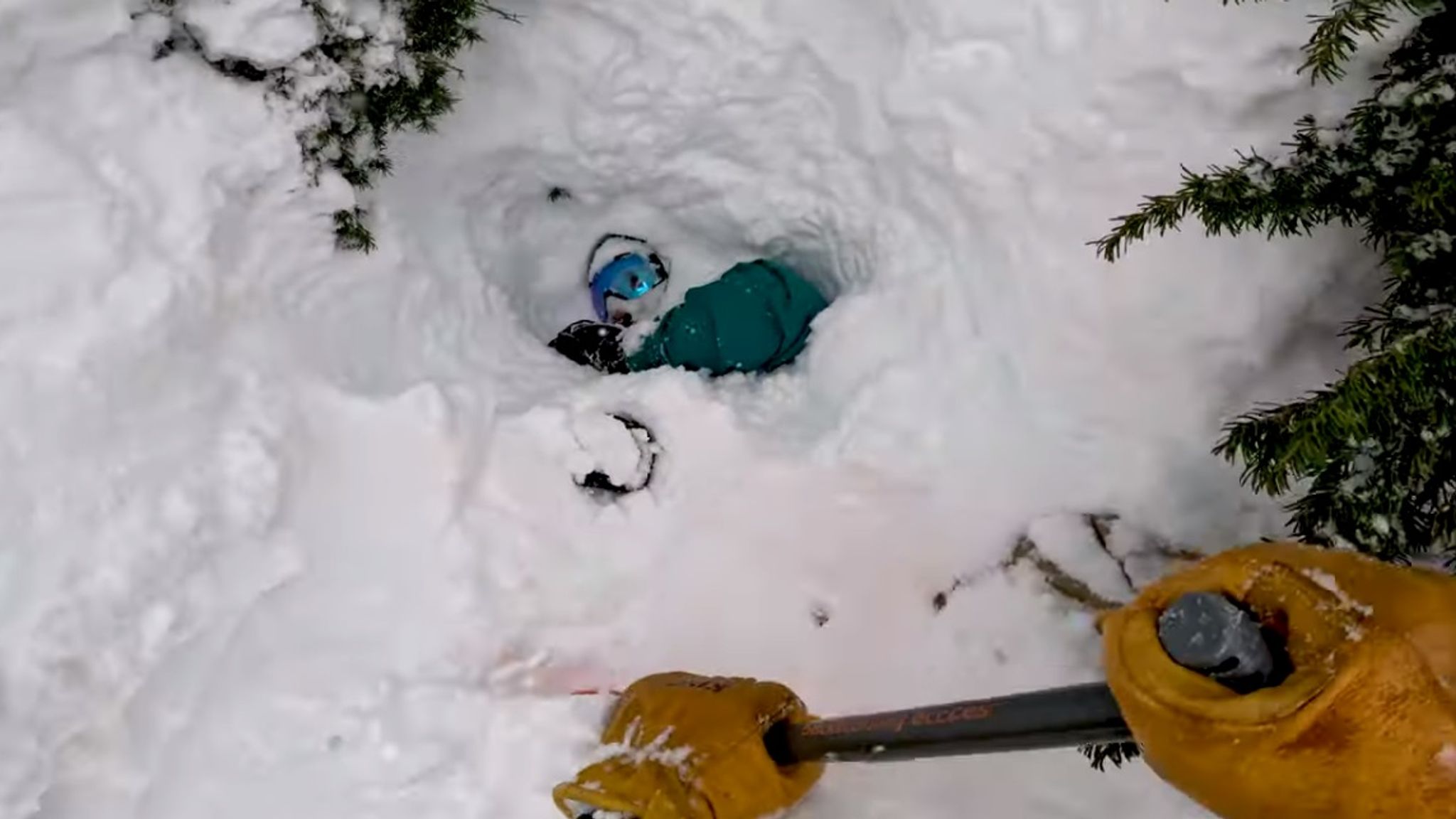 Terrifying video showing man buried headfirst in snow released as ...