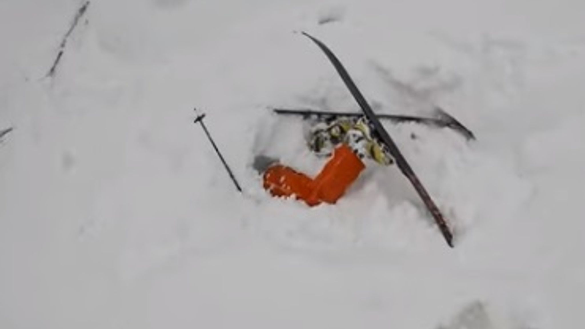 Terrifying video showing man buried headfirst in snow released as ...