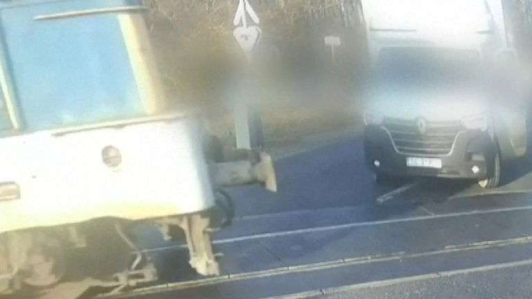 Driver Narrowly Misses Being Hit By Moving Train After Crashing Into