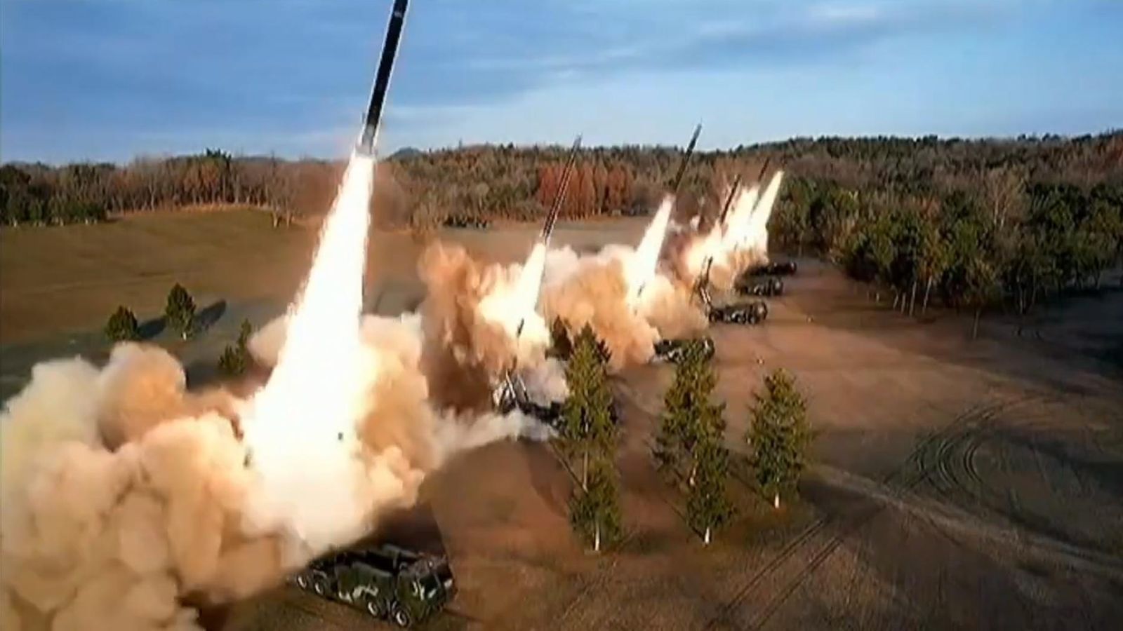 North Korea: Kim Jong Un oversees ‘super-large’ rocket launchers | World News | Sky News