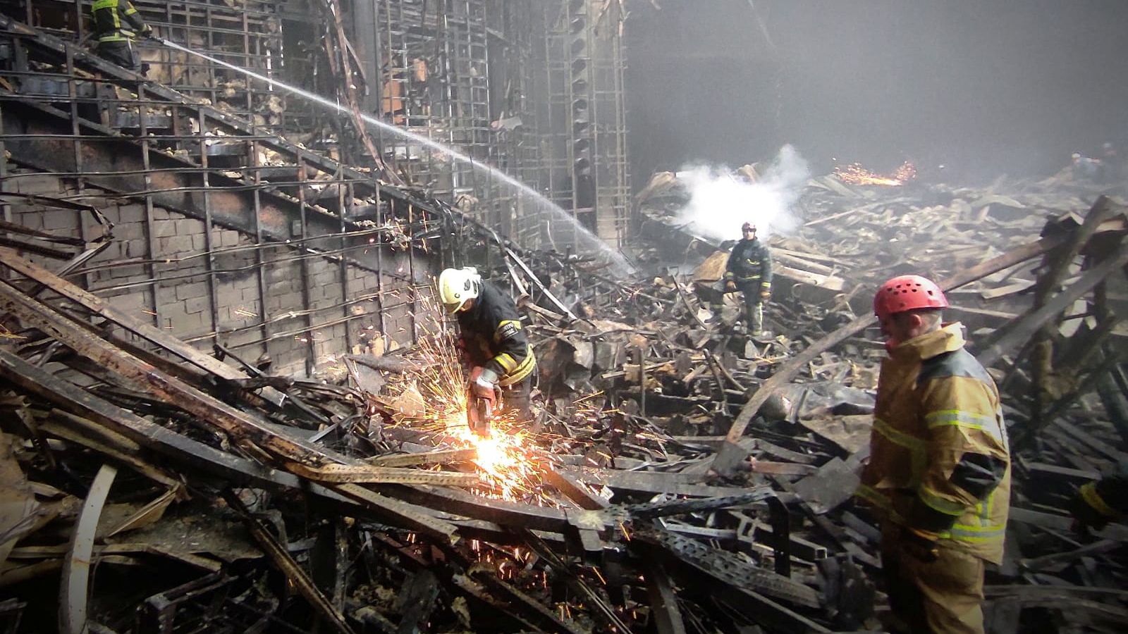 Russia mourns victims of deadly concert hall attack as families of ...