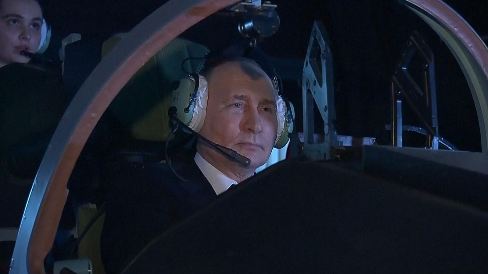 Russia: Putin tests out flight simulator during aviation school visit ...