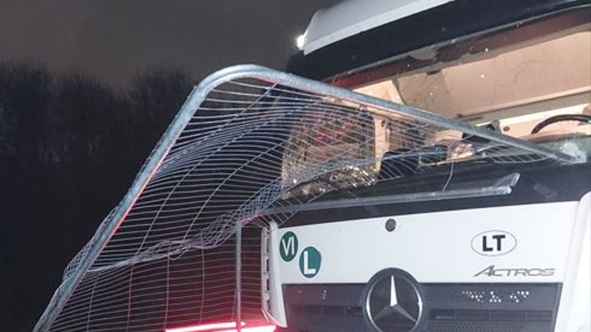 Two boys arrested after fence thrown off 'Curly Wurly' bridge smashes ...