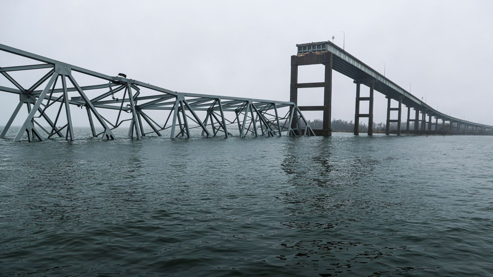 Baltimore bridge salvage crews begin removing containers from cargo ...