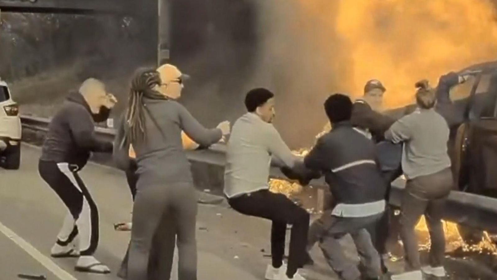 Minnesota: Driver rescued from burning car after crashing into guardrail | US News | Sky News