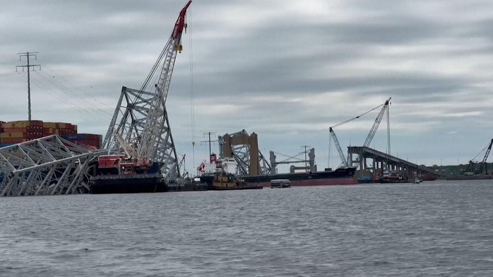 Baltimore bridge collapse: First ship passes through new channel | US ...