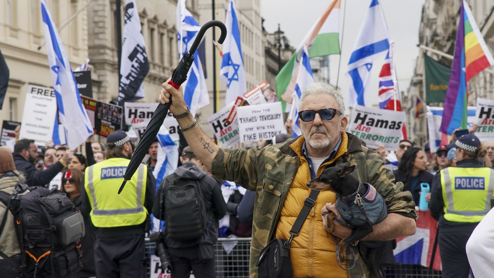 Pro-Palestinian protests: Man arrested for carrying swastika placard ...