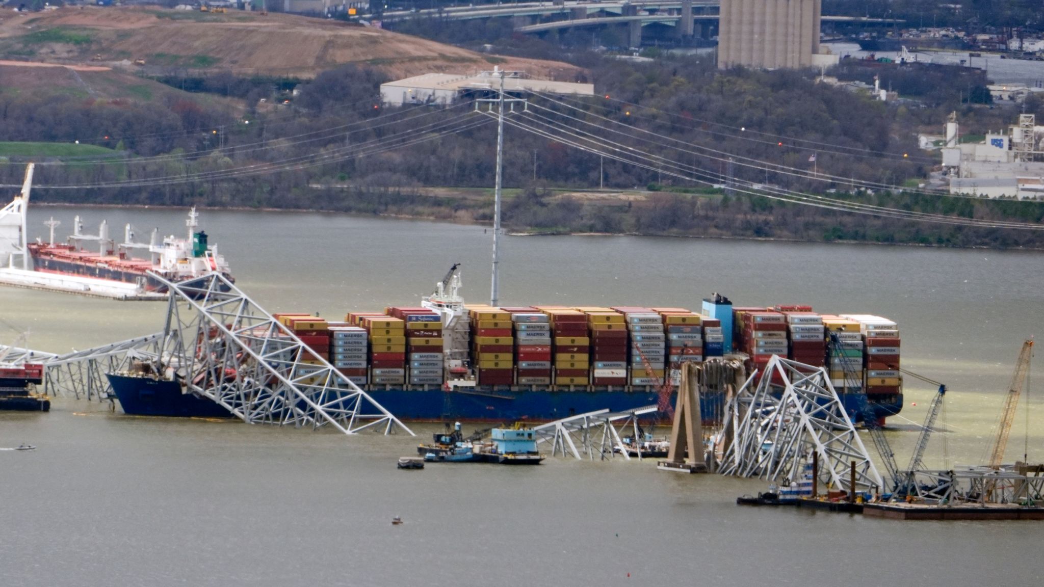 Baltimore bridge salvage crews begin removing containers from cargo ... Baltimore bridge salvage crews begin removing containers from cargo ...
