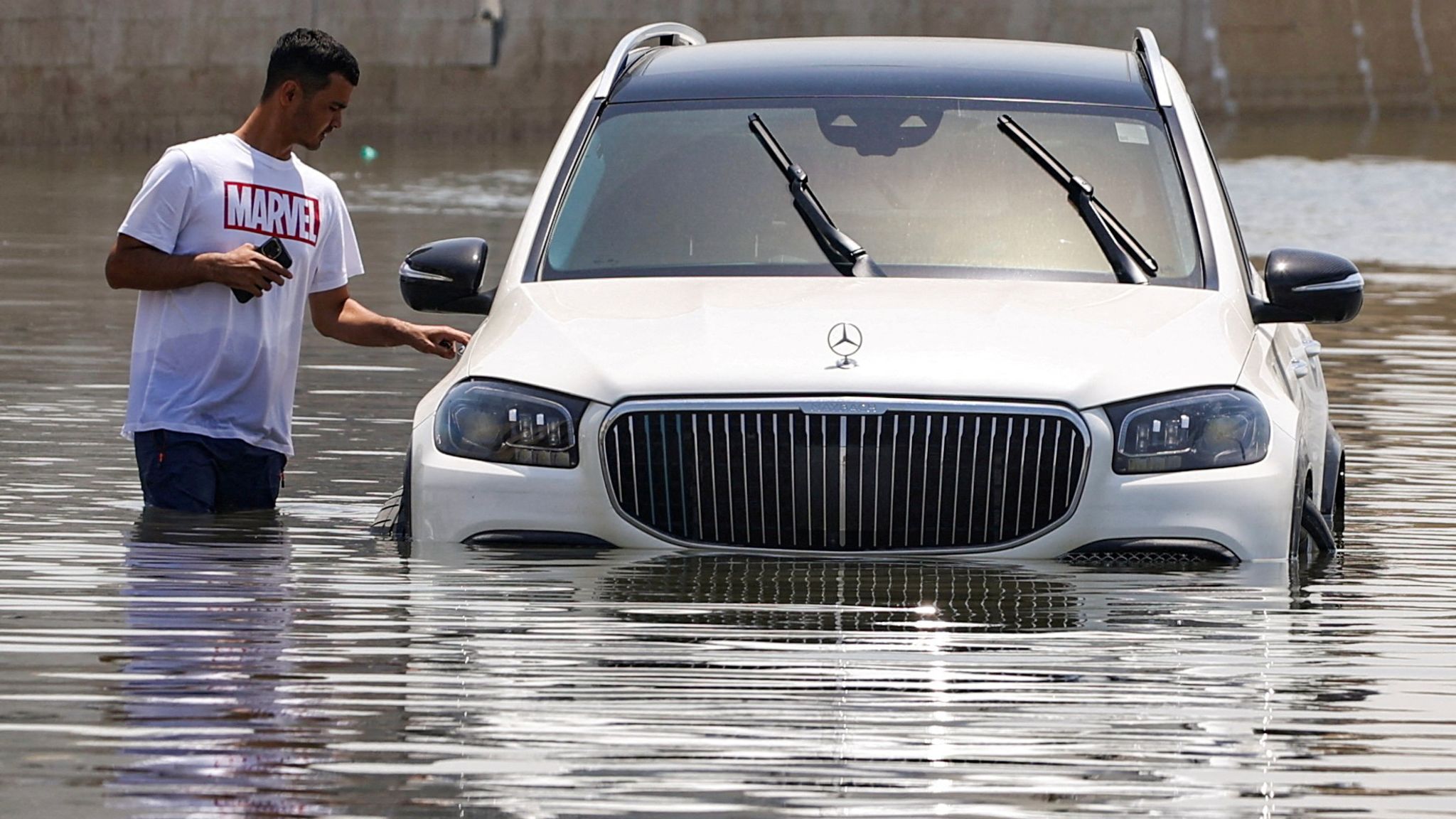 At least four dead after record-breaking rainfall in United Arab ...