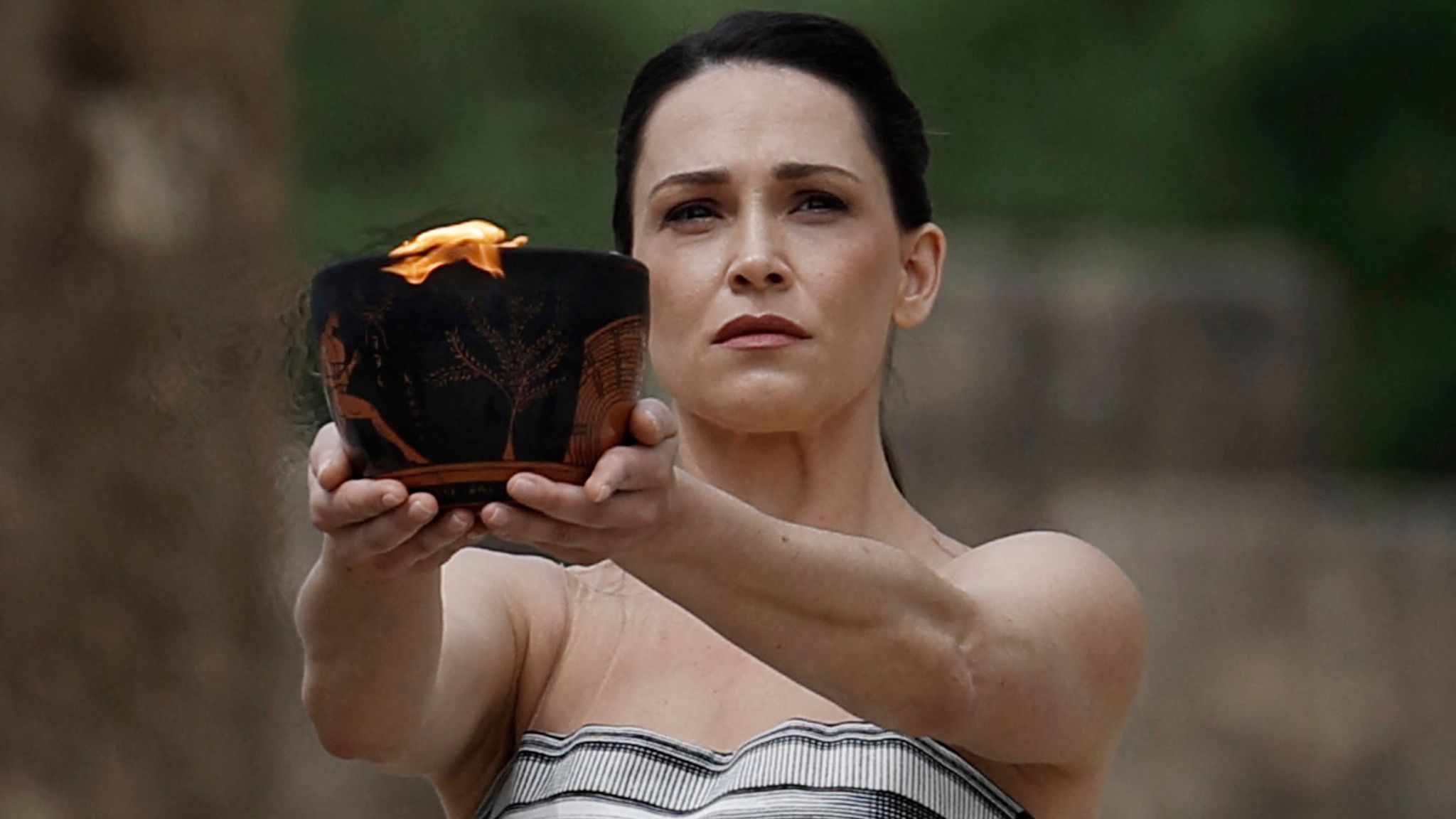 Paris Olympics torch lit at site of ancient games in Greece | World ...
