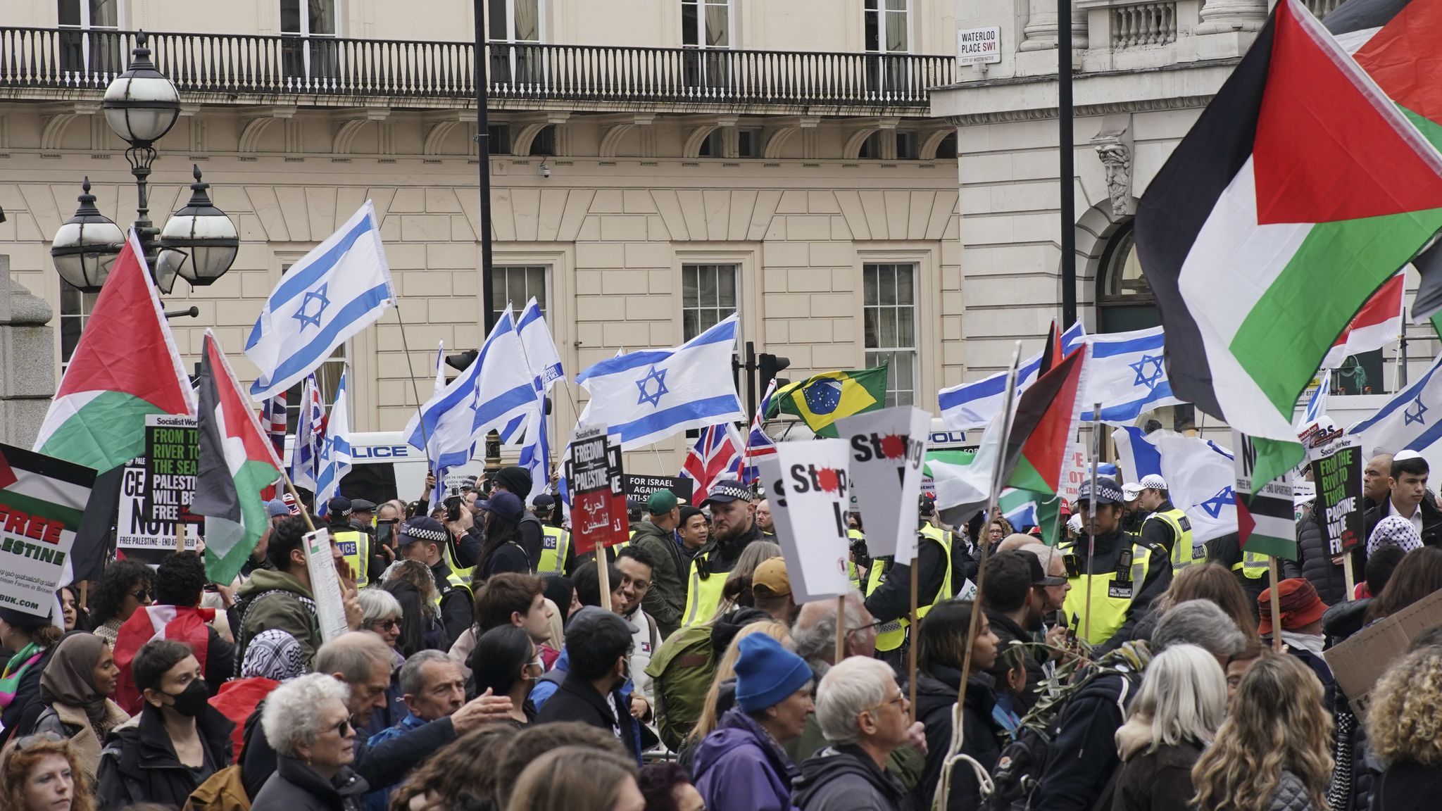 Pro-Palestinian protests: Man arrested for carrying swastika placard ...