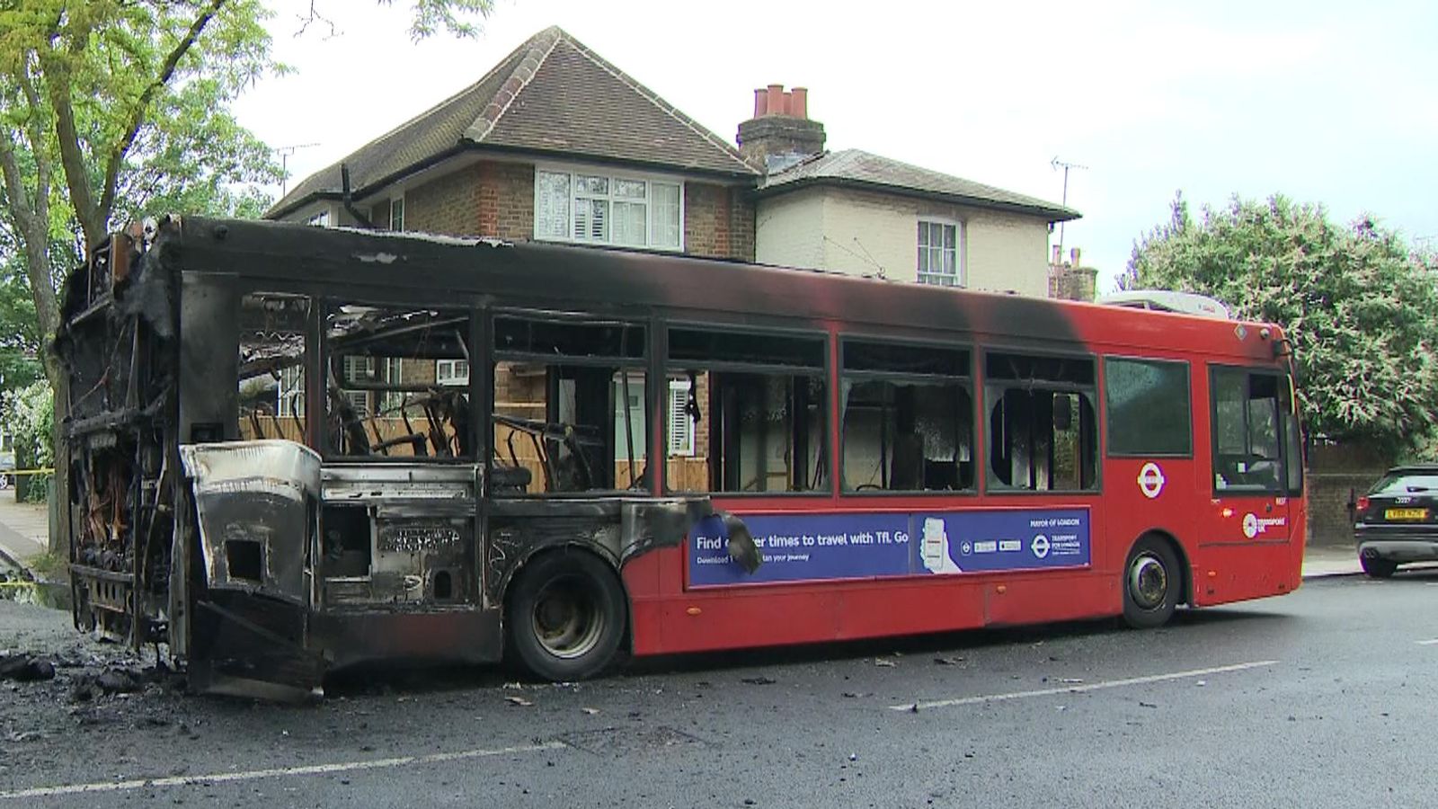 Huge fire destroys bus on road in Twickenham | UK News | Sky News