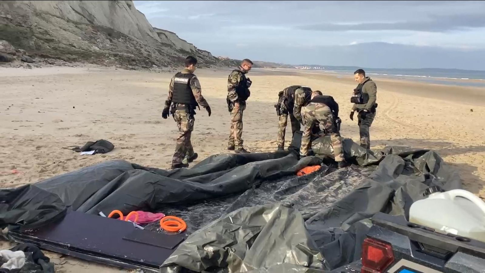 Migrants caught on Calais beach trying to cross English Channel | World ...