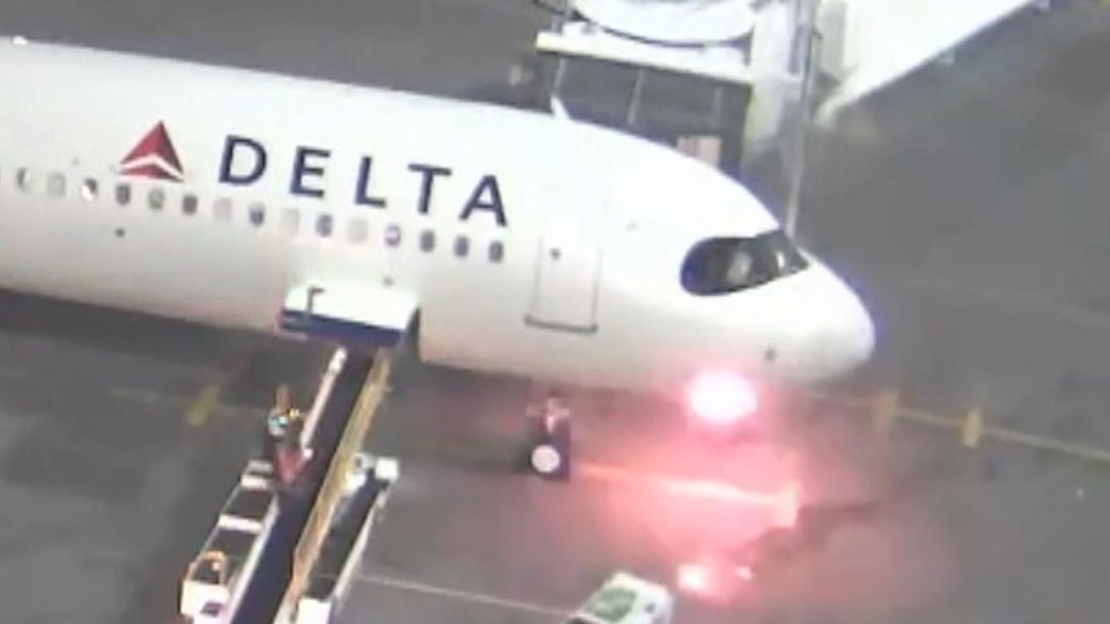 Plane catches fire in Seattle while passengers wait to disembark | US ...
